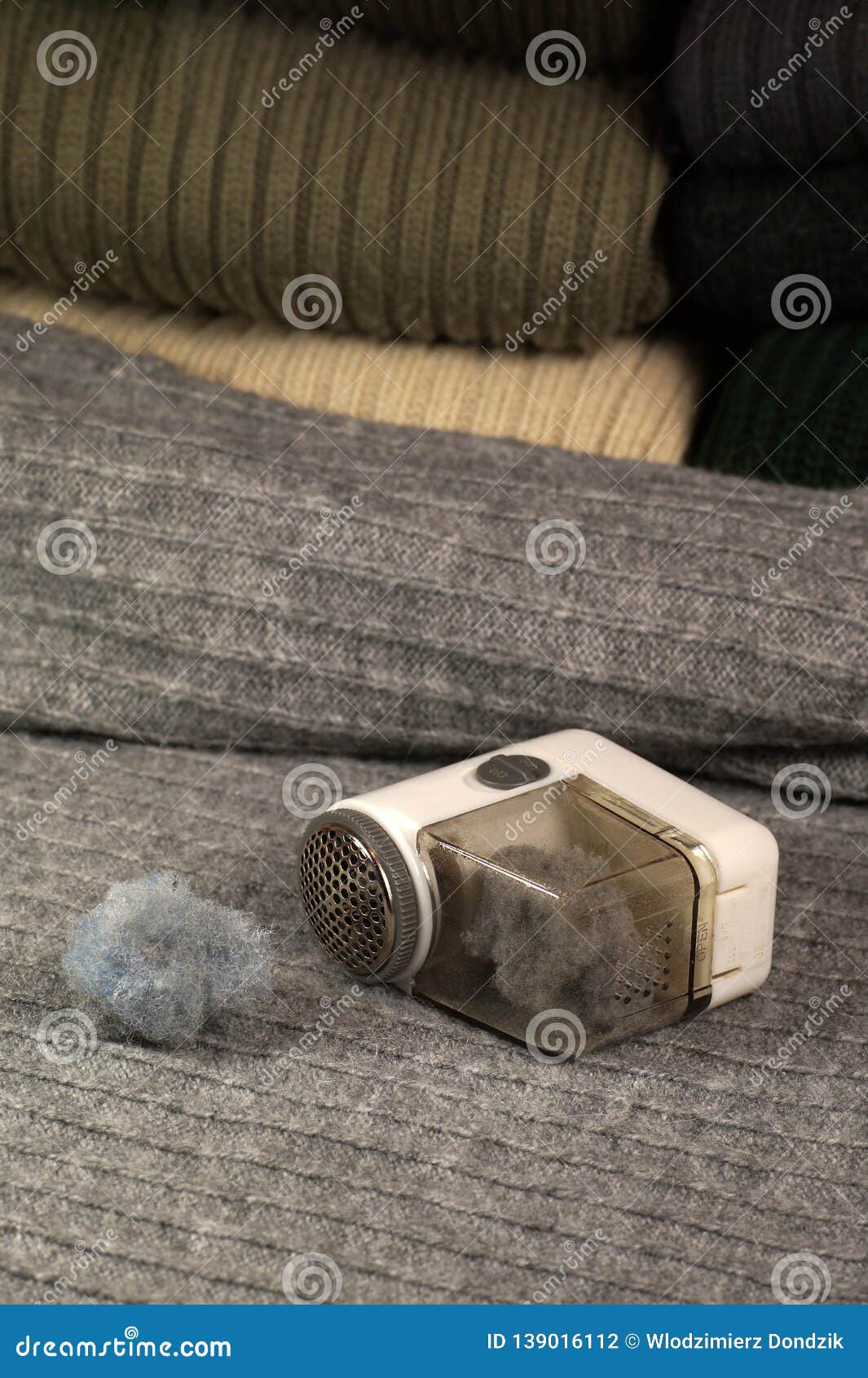 Order in Wardrobe. a Few Sweaters Prepared for Removing Lint Pilling ...