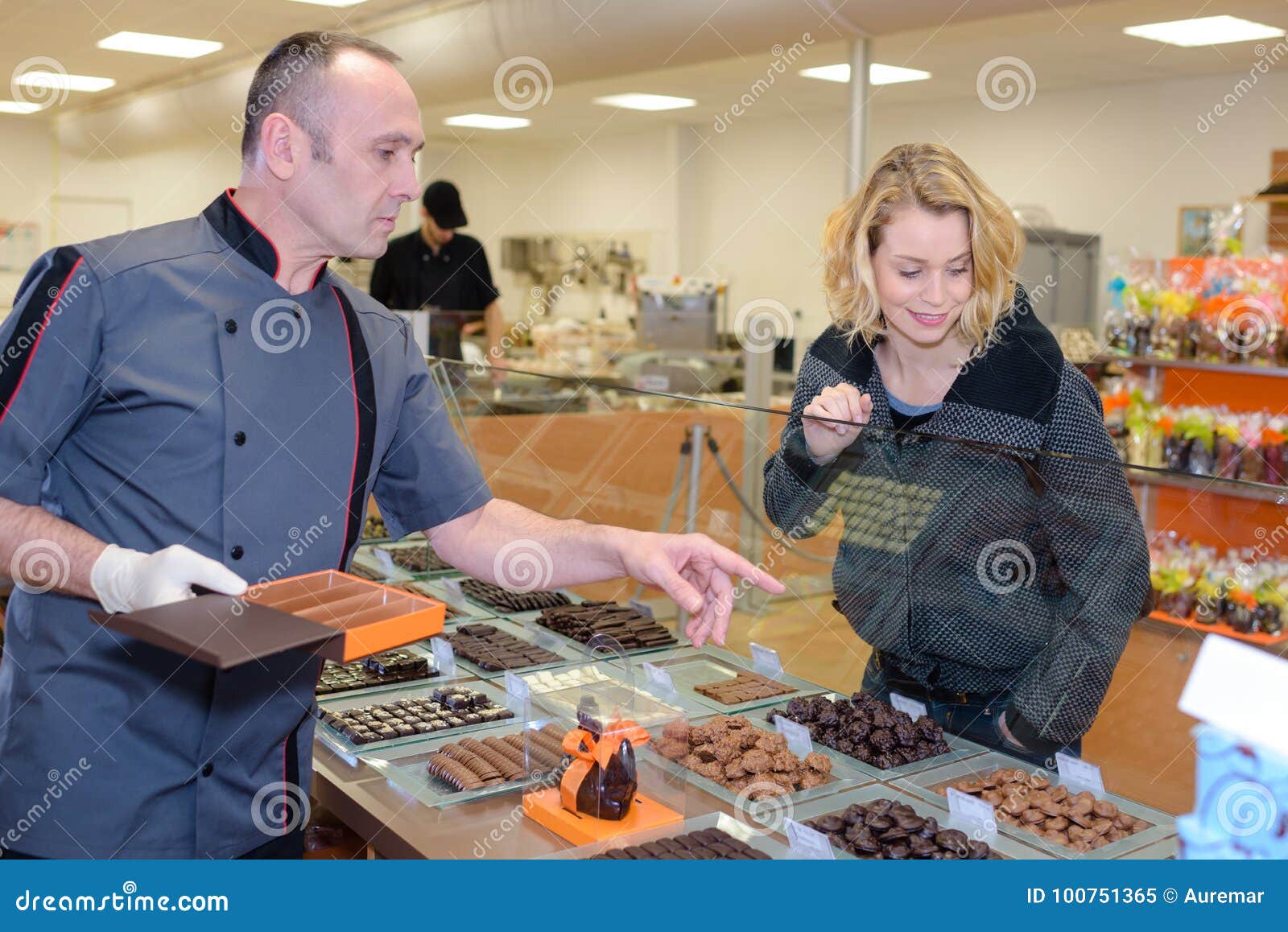 Ordering box chocolates stock image. Image of product - 100751365