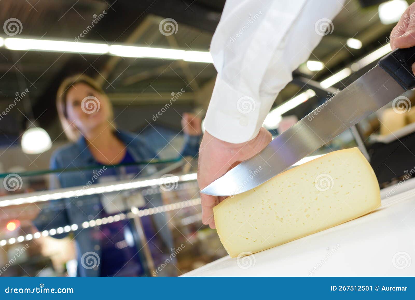 Ordering at cheese counter stock image. Image of knife - 267512501