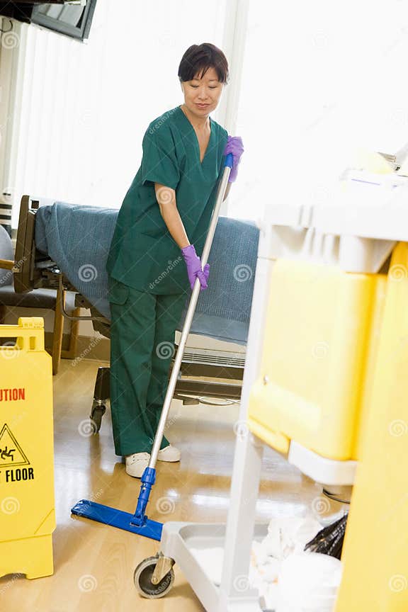 An Orderly Mopping the Floor in a Hospital Stock Image - Image of glove ...