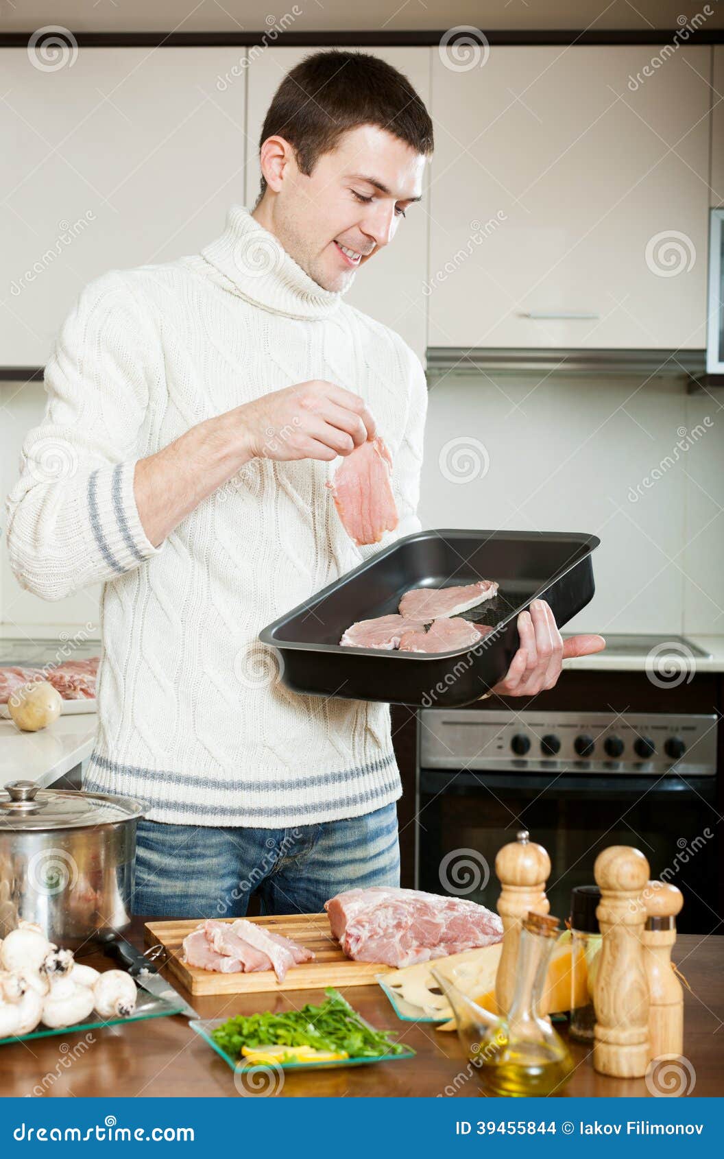 Ordinary guy with raw meat stock photo. Image of ingredient - 39455844