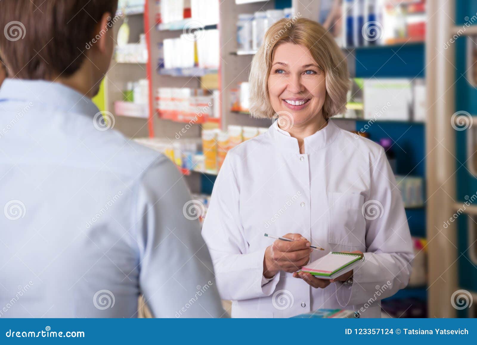 Ordinary Guy Talking To Pharmacist at Pharmacy Stock Photo - Image of ...
