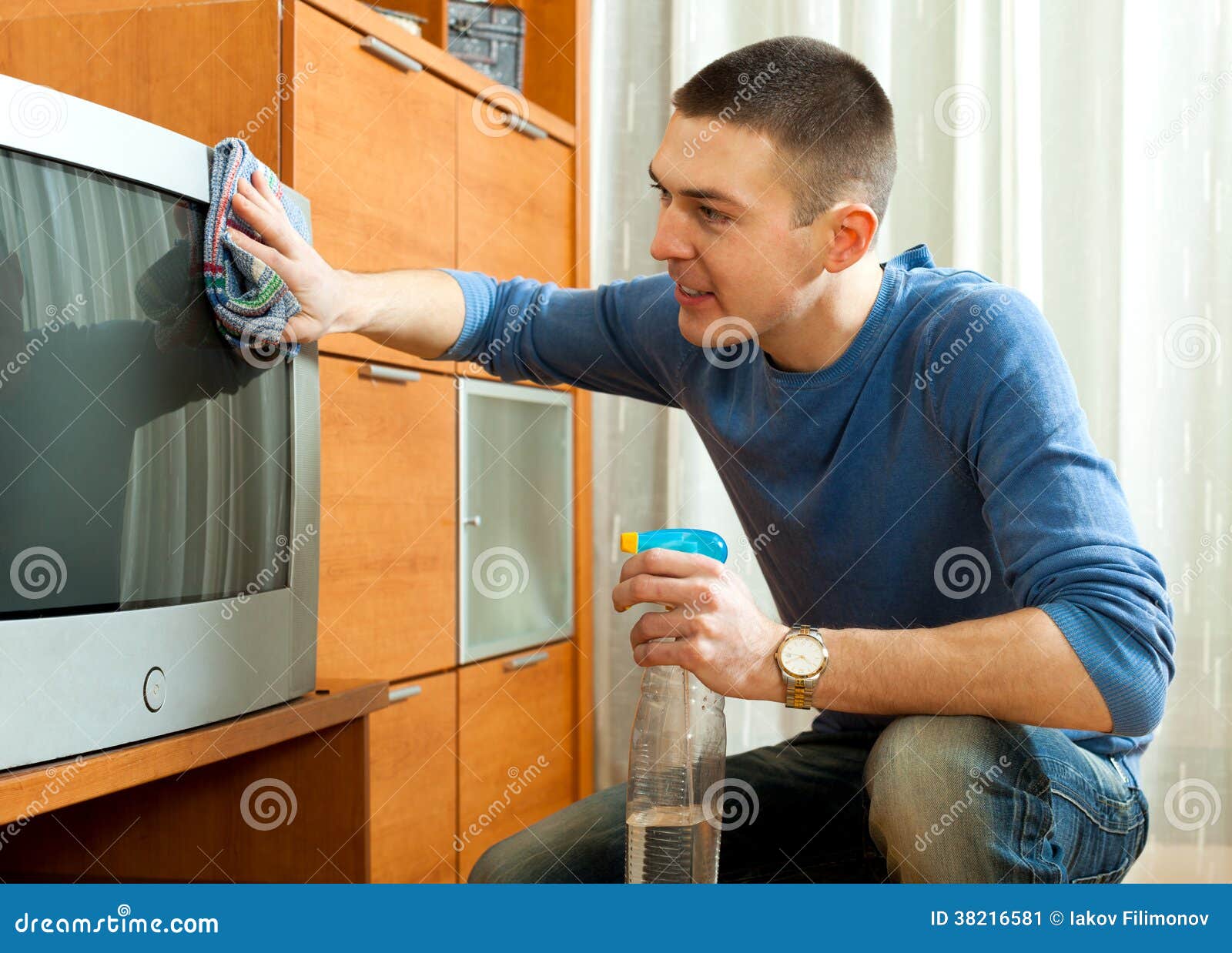 Ordinary Guy Wiping the Dust on TV Stock Image - Image of household ...