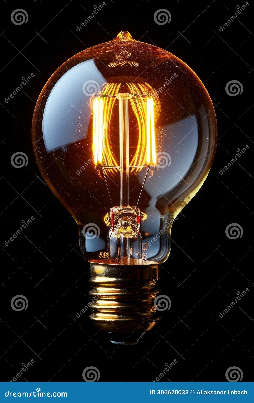 An Ordinary Incandescent Light Bulb Burning on a Black Background Stock ...