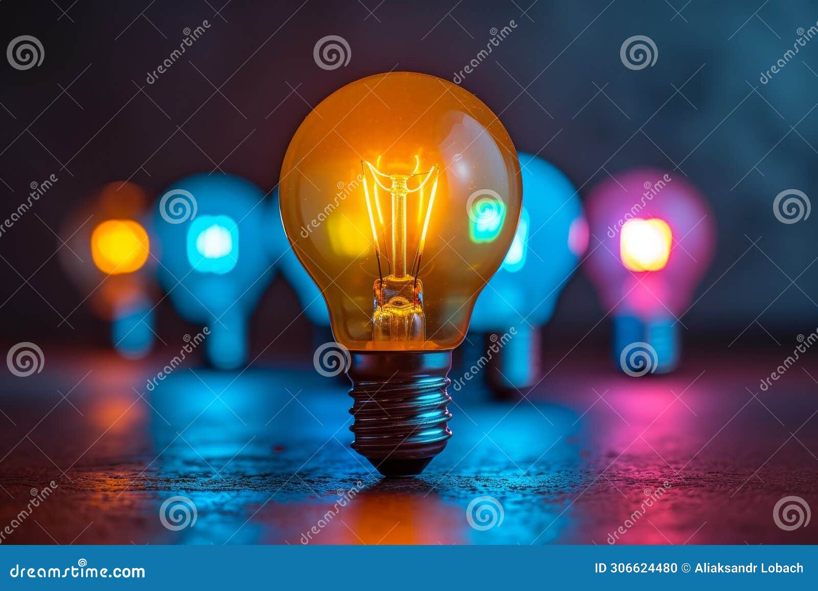 An Ordinary Incandescent Light Bulb Stands on the Table and Burns at ...