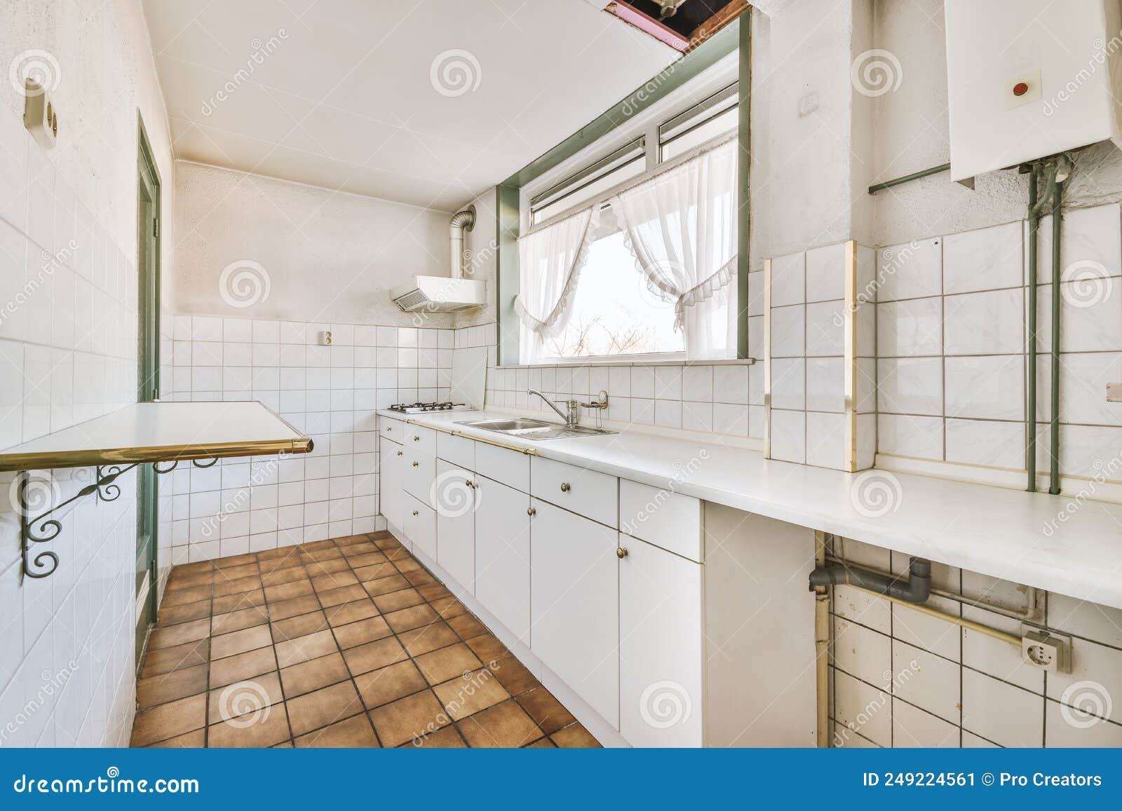 Ordinary kitchen room with stock image. Image of house - 249224561