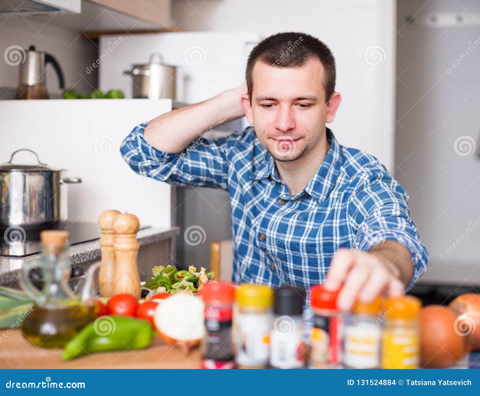 Man Adding Spice To the Salad Stock Photo - Image of home, domestic ...