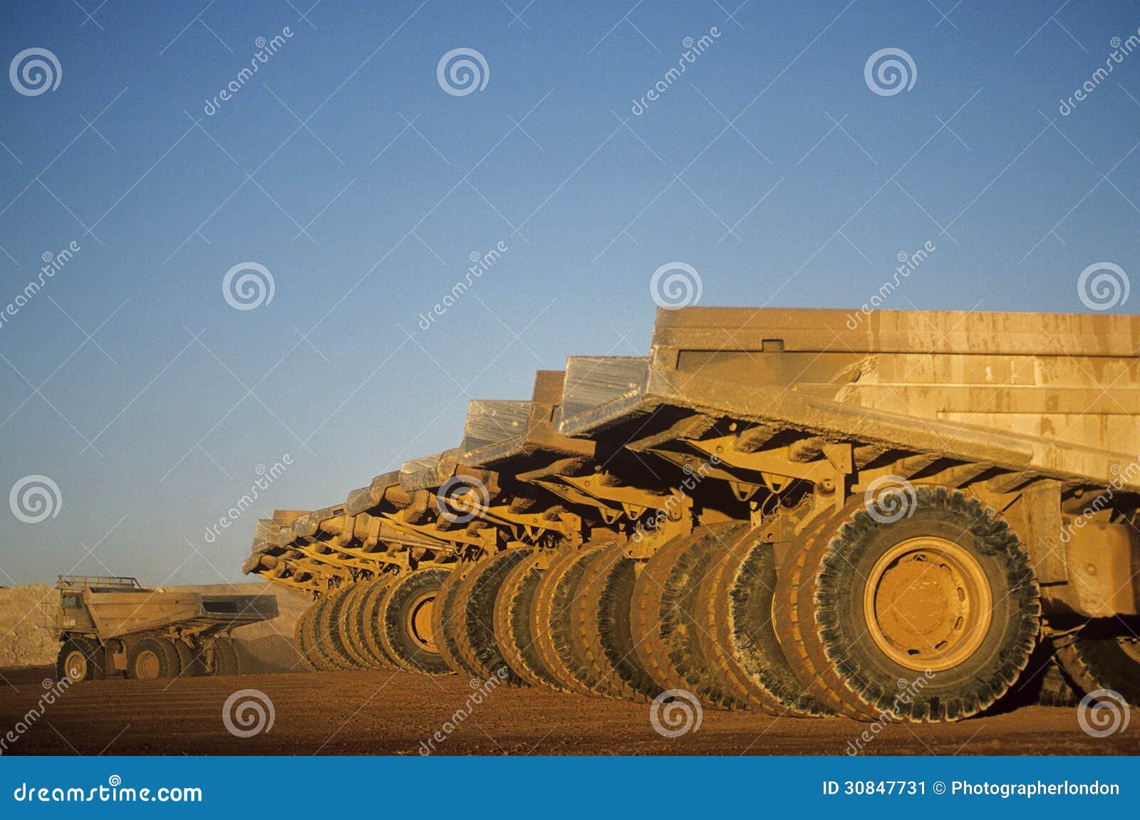 Ore Hauling Trucks in Row Telfer Western Australia Stock Image - Image ...