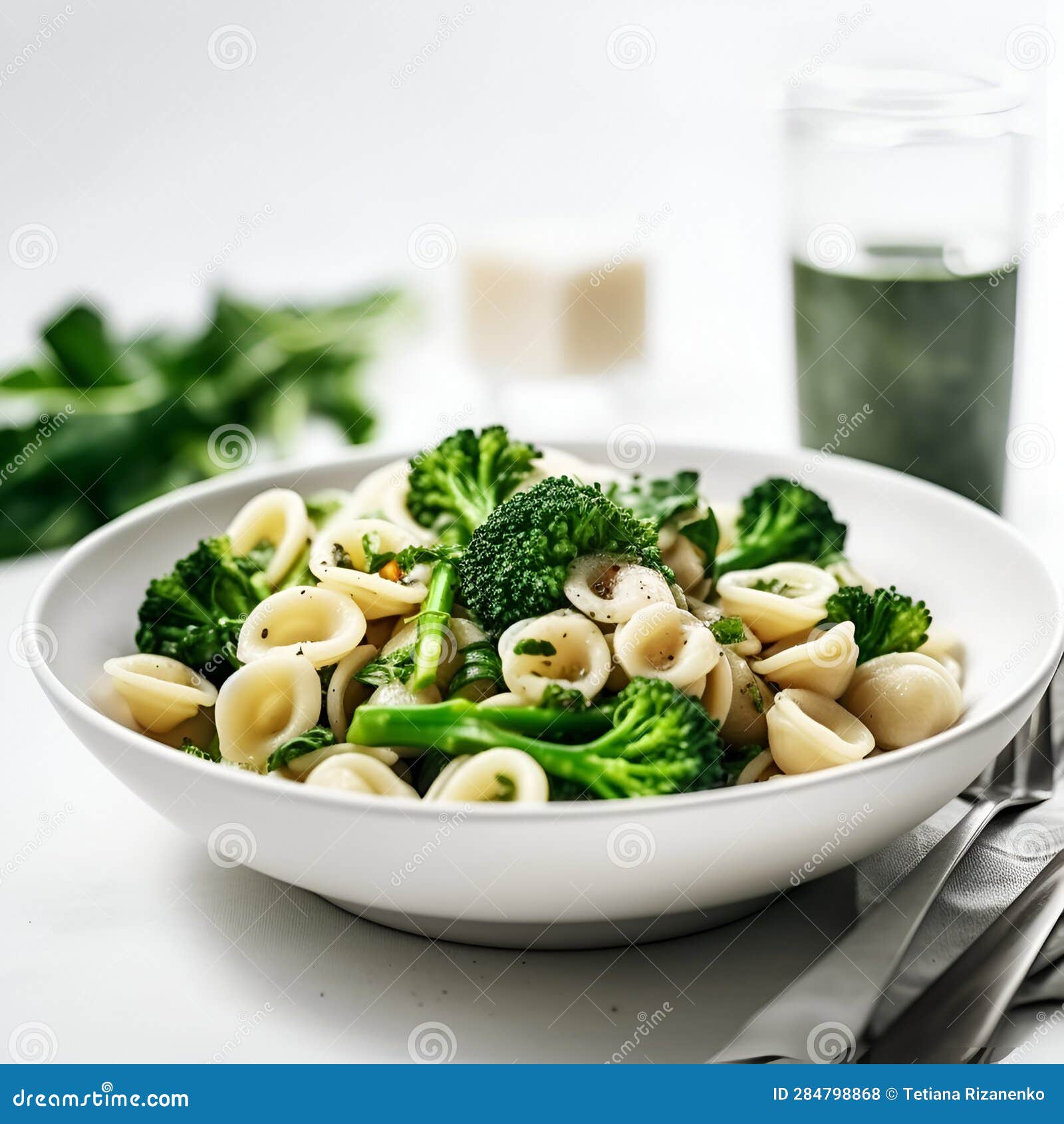 Orecchiette Pasta with Broccoli Rabe on the Plate on the Table Stock ...