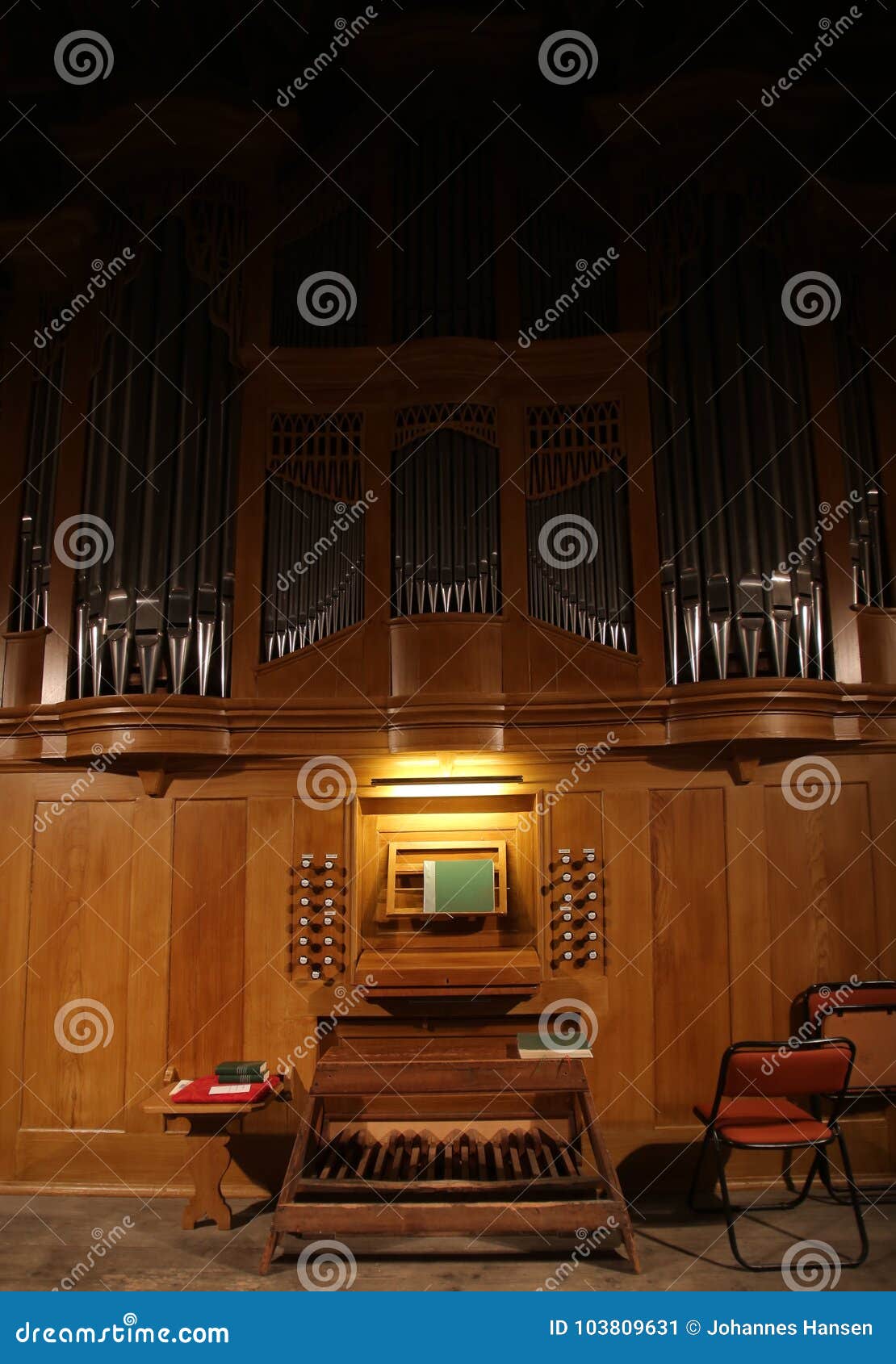 Organ Console with Various Books and Pipes on the Top Stock Image ...
