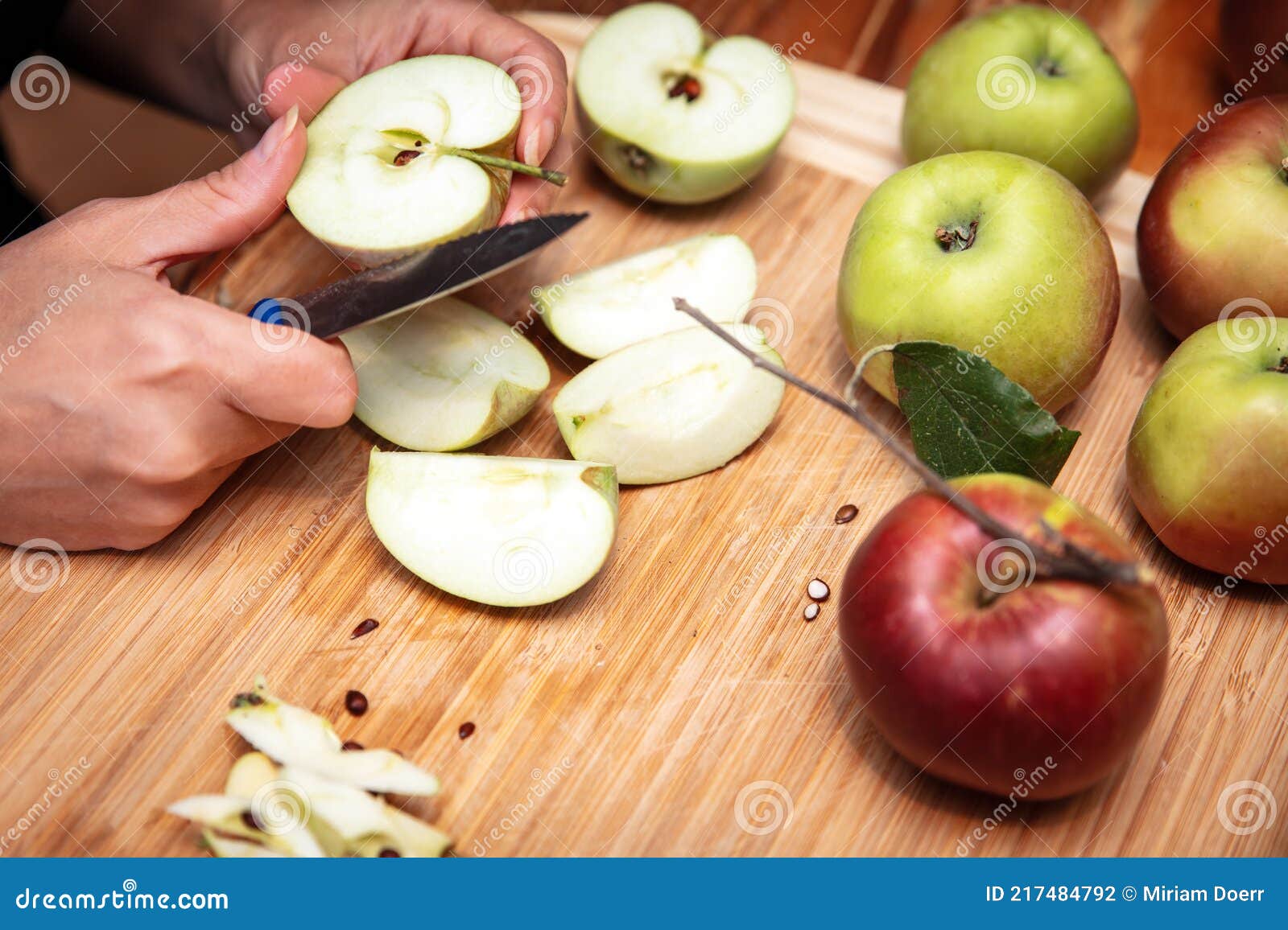 Organic Apples are Cutting in Chunks, Preparation for Baking or Cooking ...