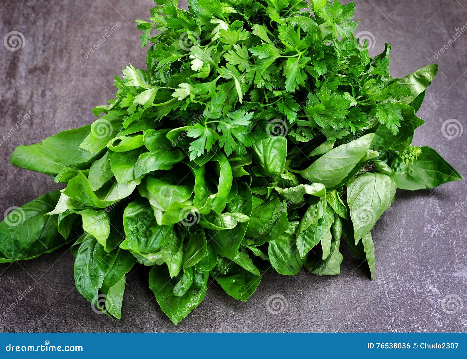Organic Basil and Parsley on a Granite Background. Stock Photo - Image ...