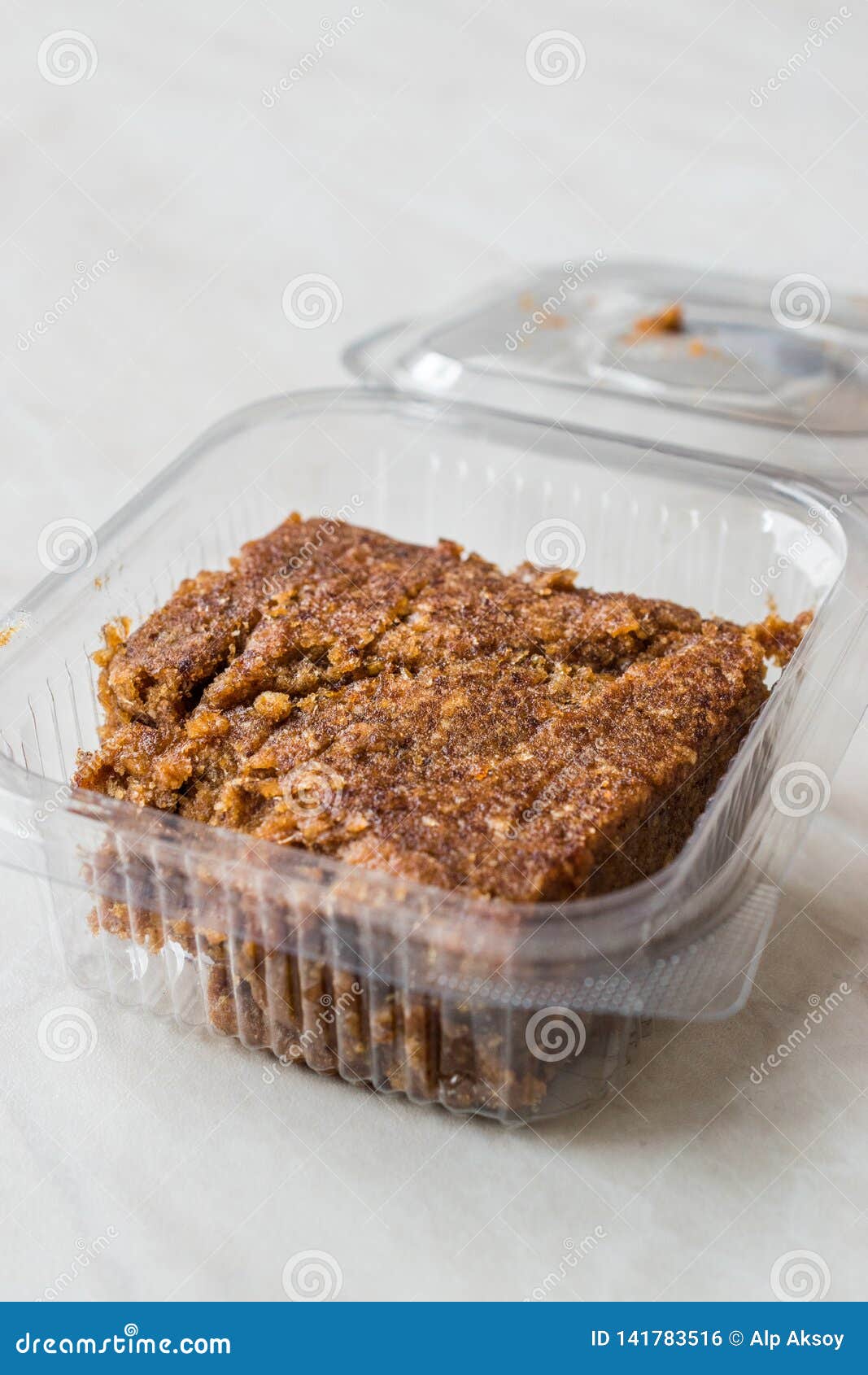 Organic Date Fruit Paste Dough in Plastic Box Container / Package Stock ...