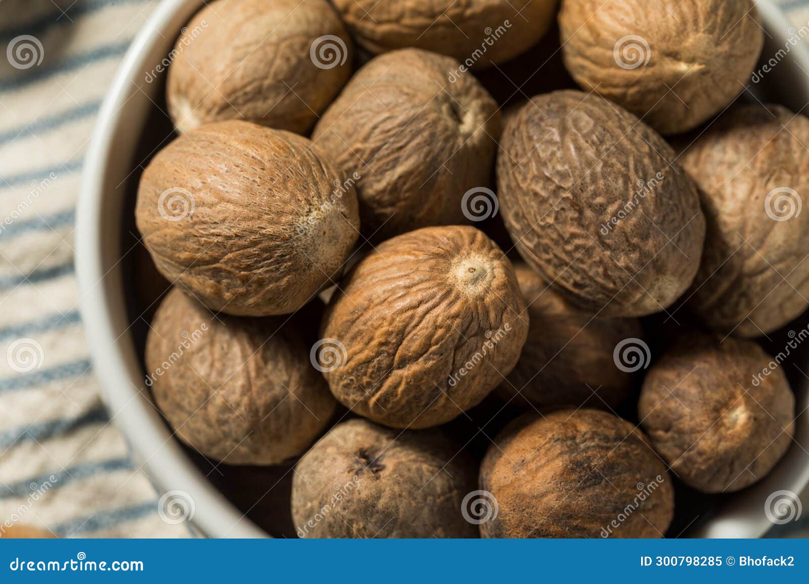 Organic Dry Whole Nutmeg stock image. Image of delicious - 300798285