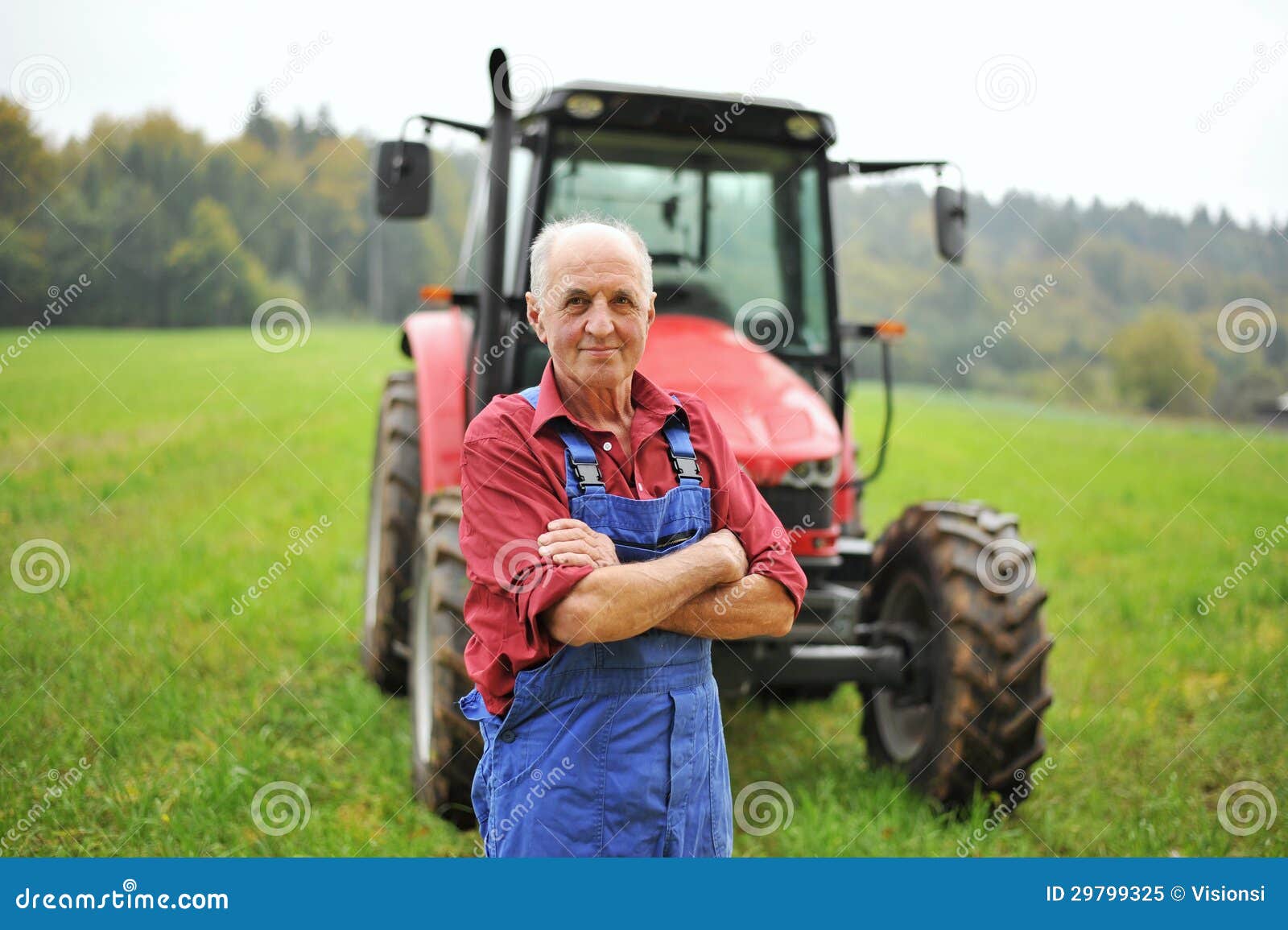 Farmer With Tractor Seeding - Sowing Crops At Agricultural Field Stock ...