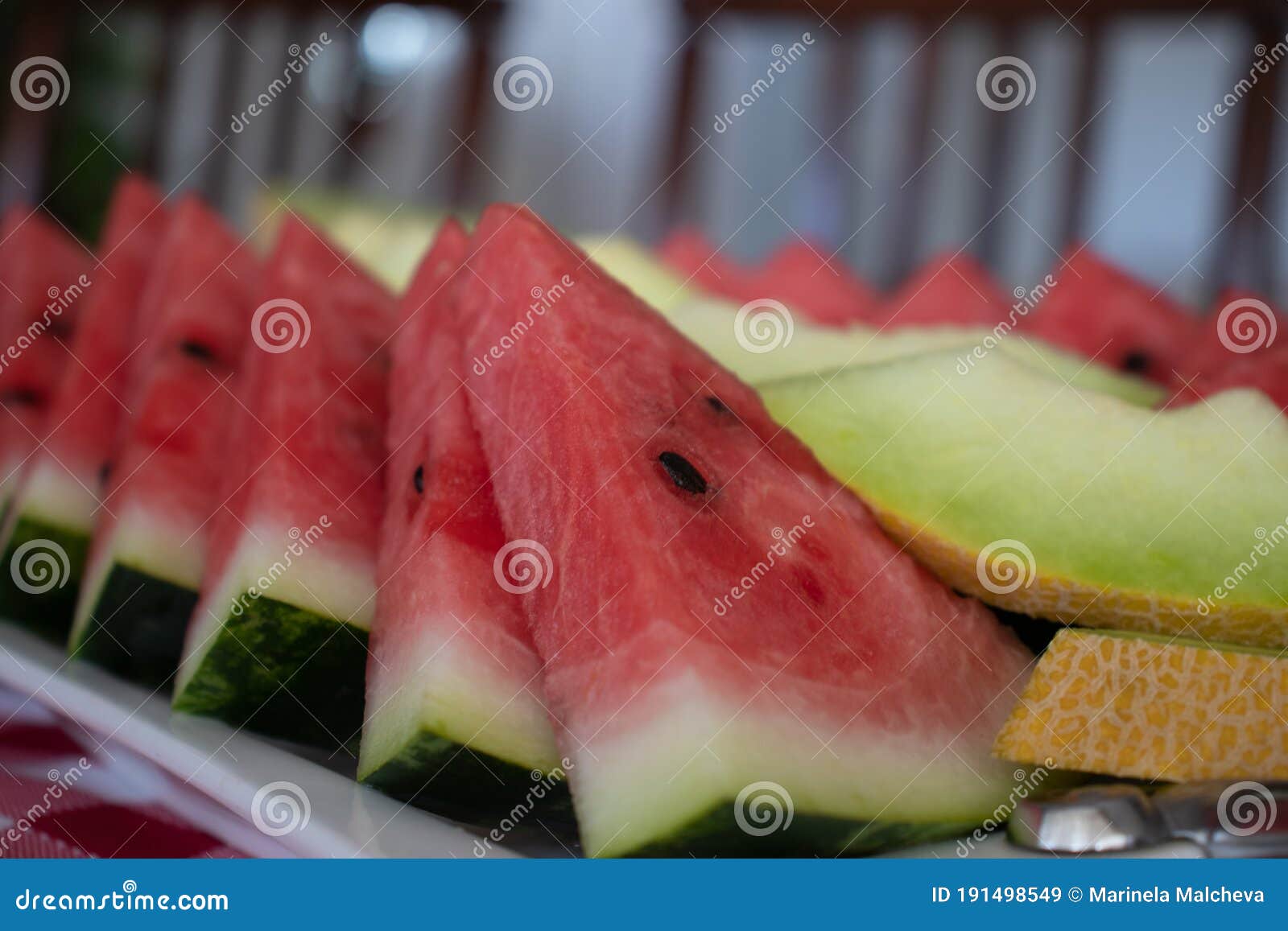 Organic Fresh Sliced Watermelon and Melon on a White Tray Stock Image ...