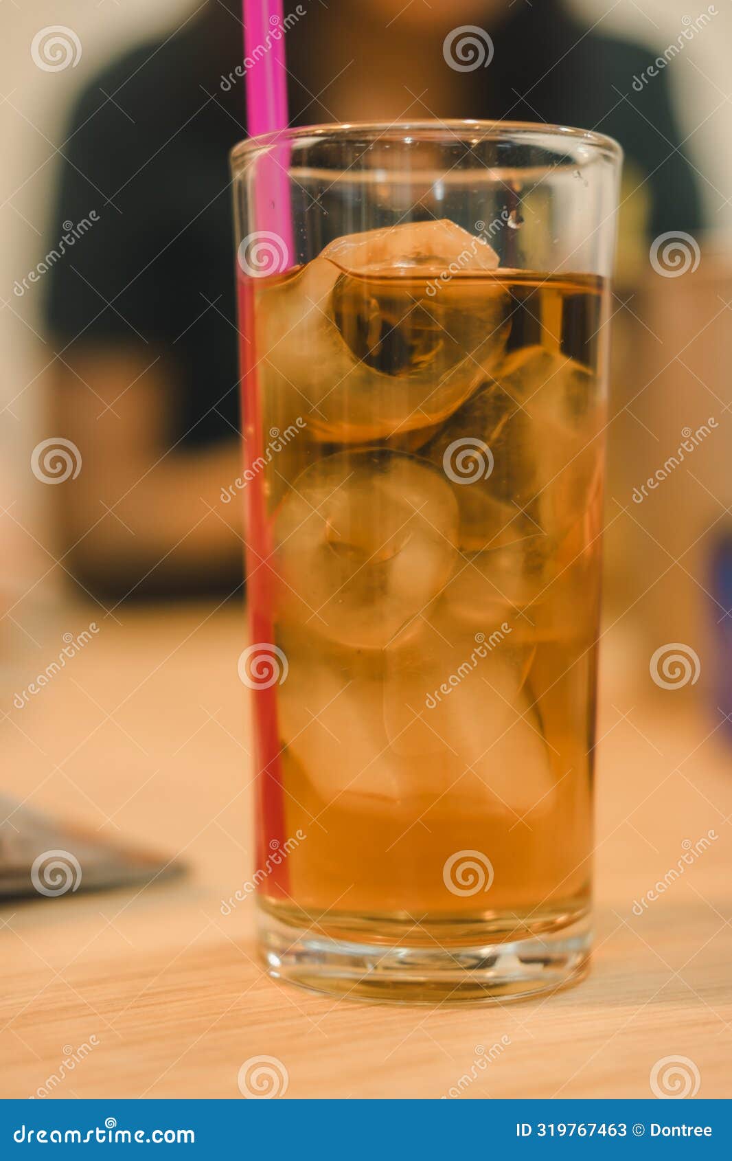 Organic Iced Tea with Ice Cubes and Pink Straw Stock Image - Image of ...