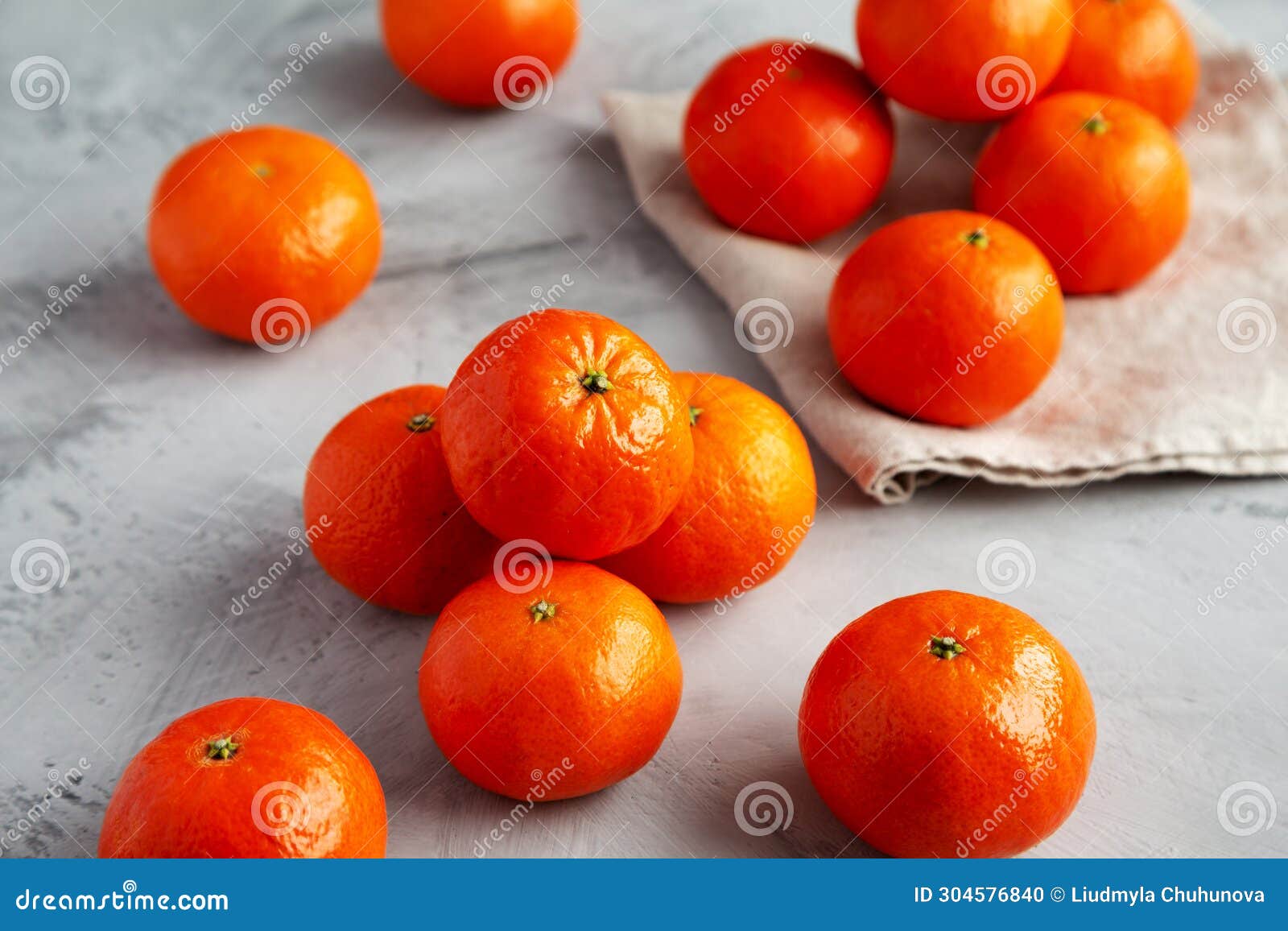 Organic Raw Mandarin Oranges on a Gray Background, Side View Stock ...
