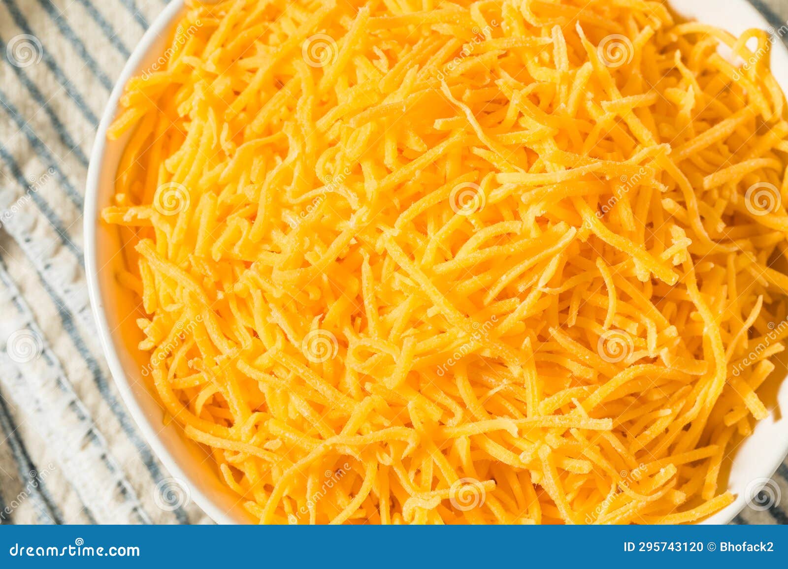Organic Raw Shredded Cheddar Cheese Stock Photo - Image of mild, fresh ...