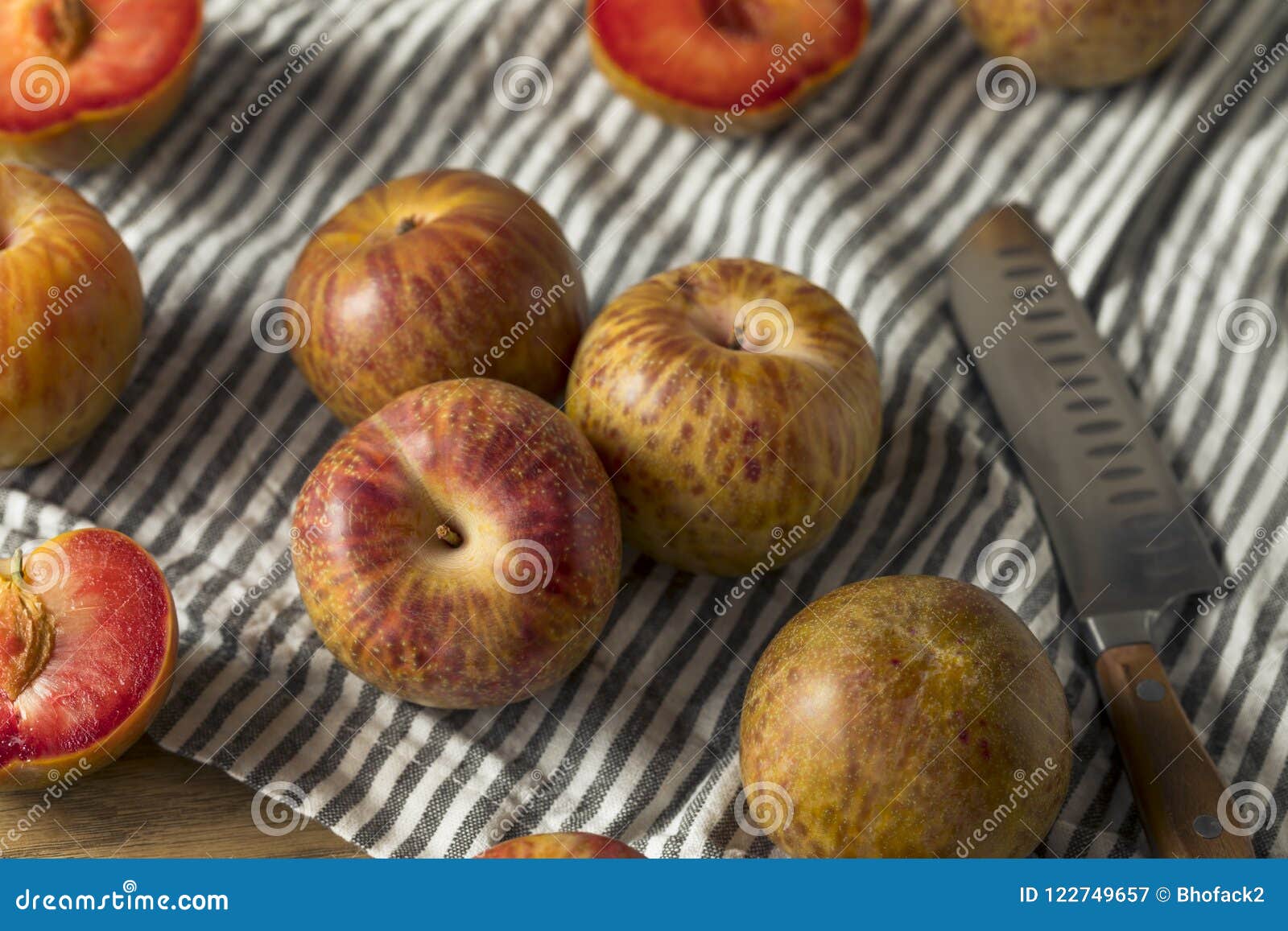 Organic Red Mottled Pluots stock image. Image of plum - 122749657
