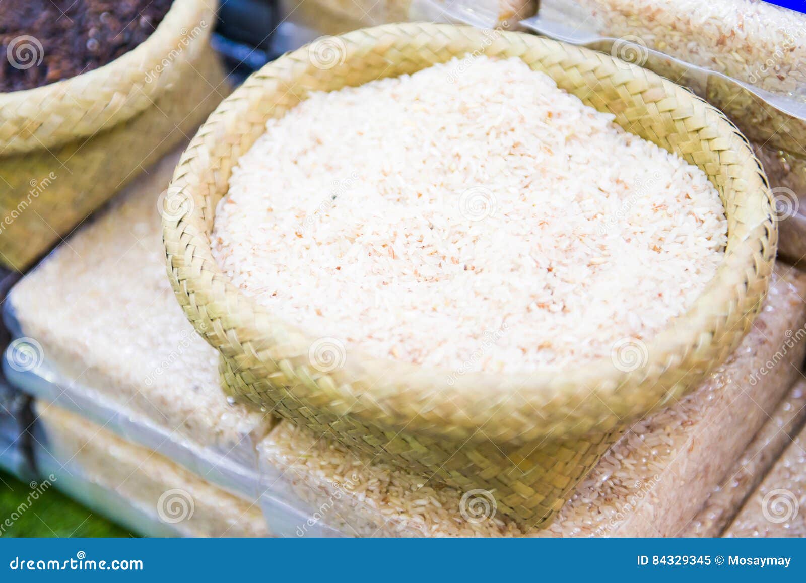 Organic rice in basket stock image. Image of product - 84329345