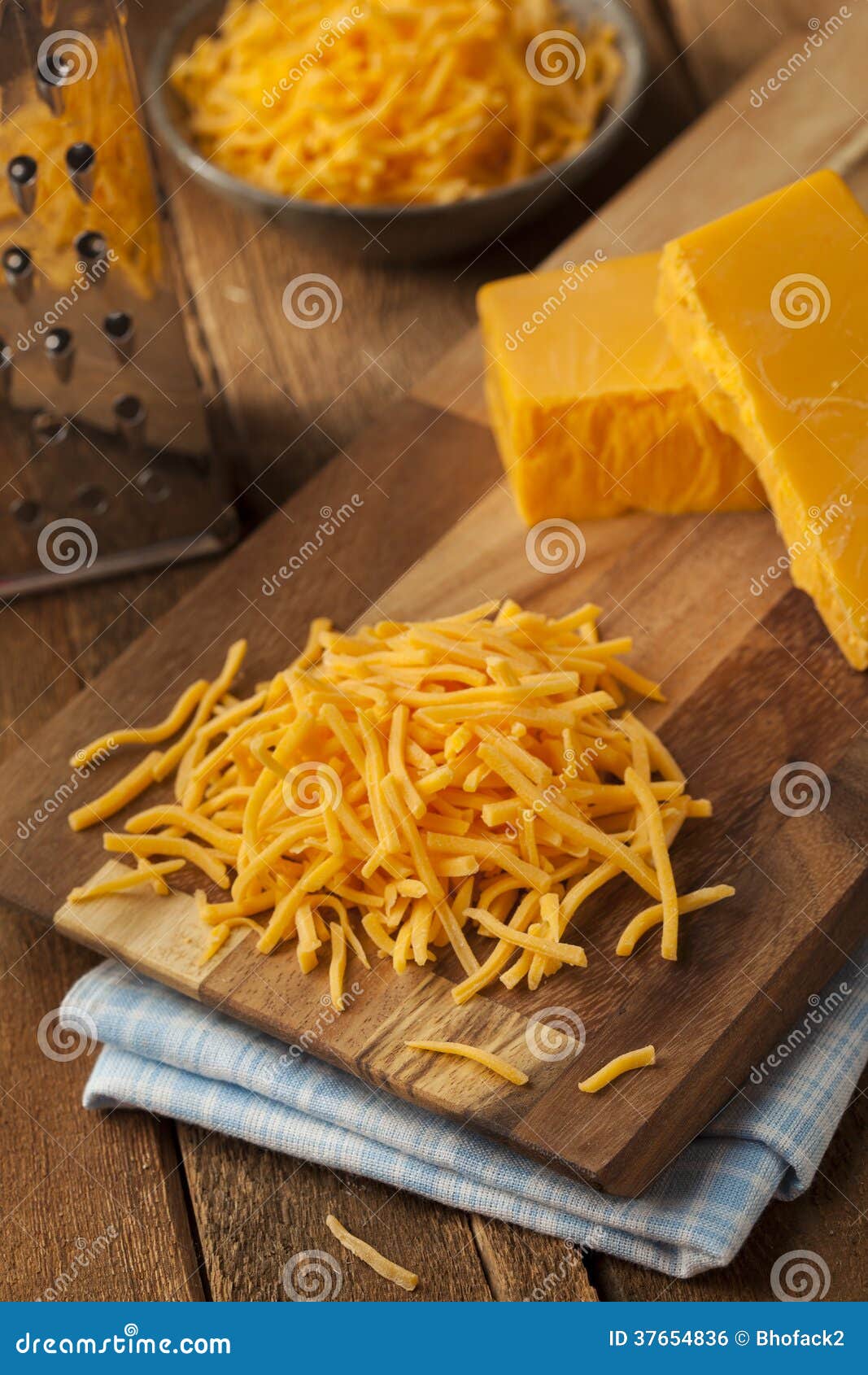 Organic Shredded Sharp Cheddar Cheese Stock Photo - Image of organic ...