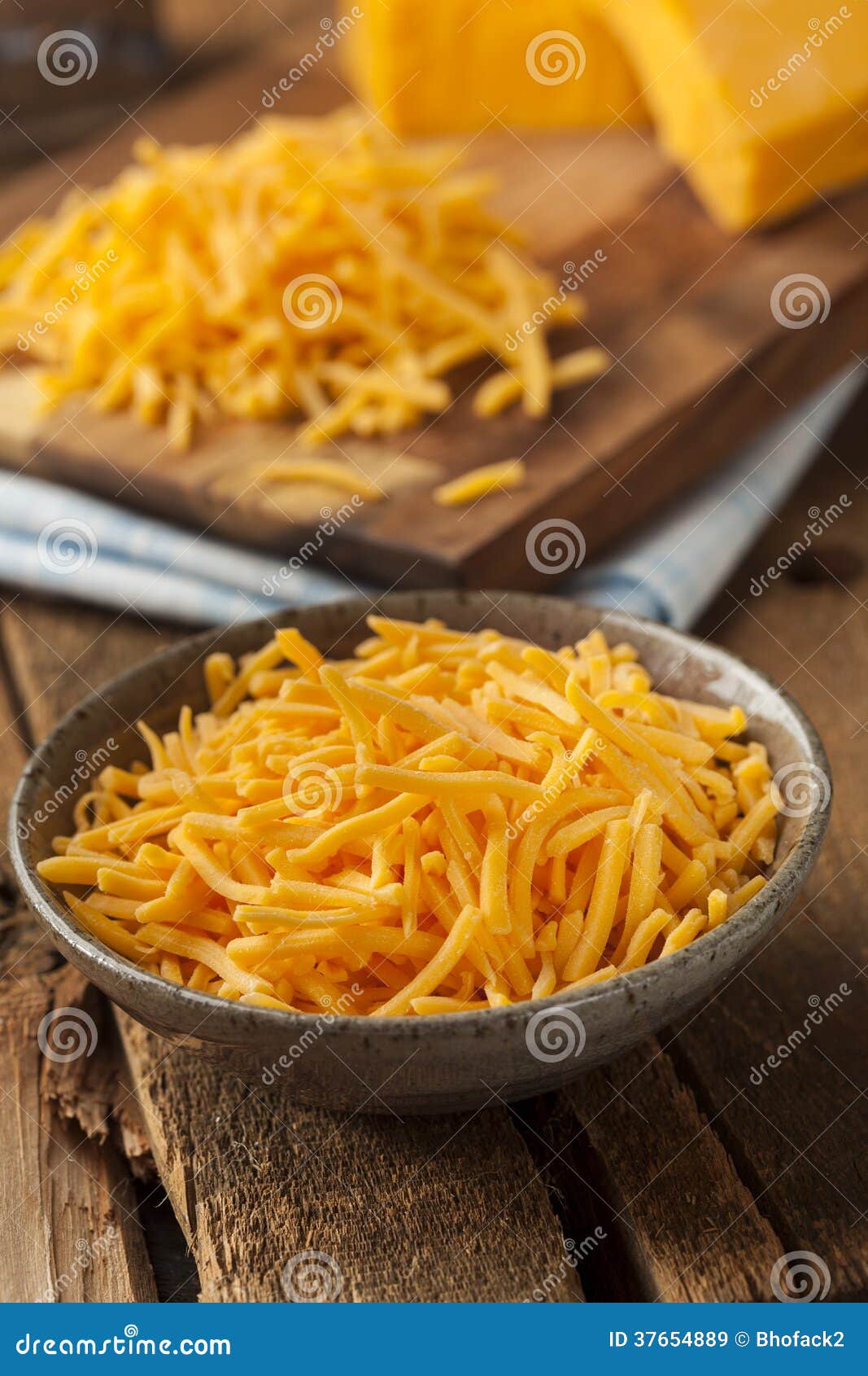 Organic Shredded Sharp Cheddar Cheese Stock Image - Image of wedge ...