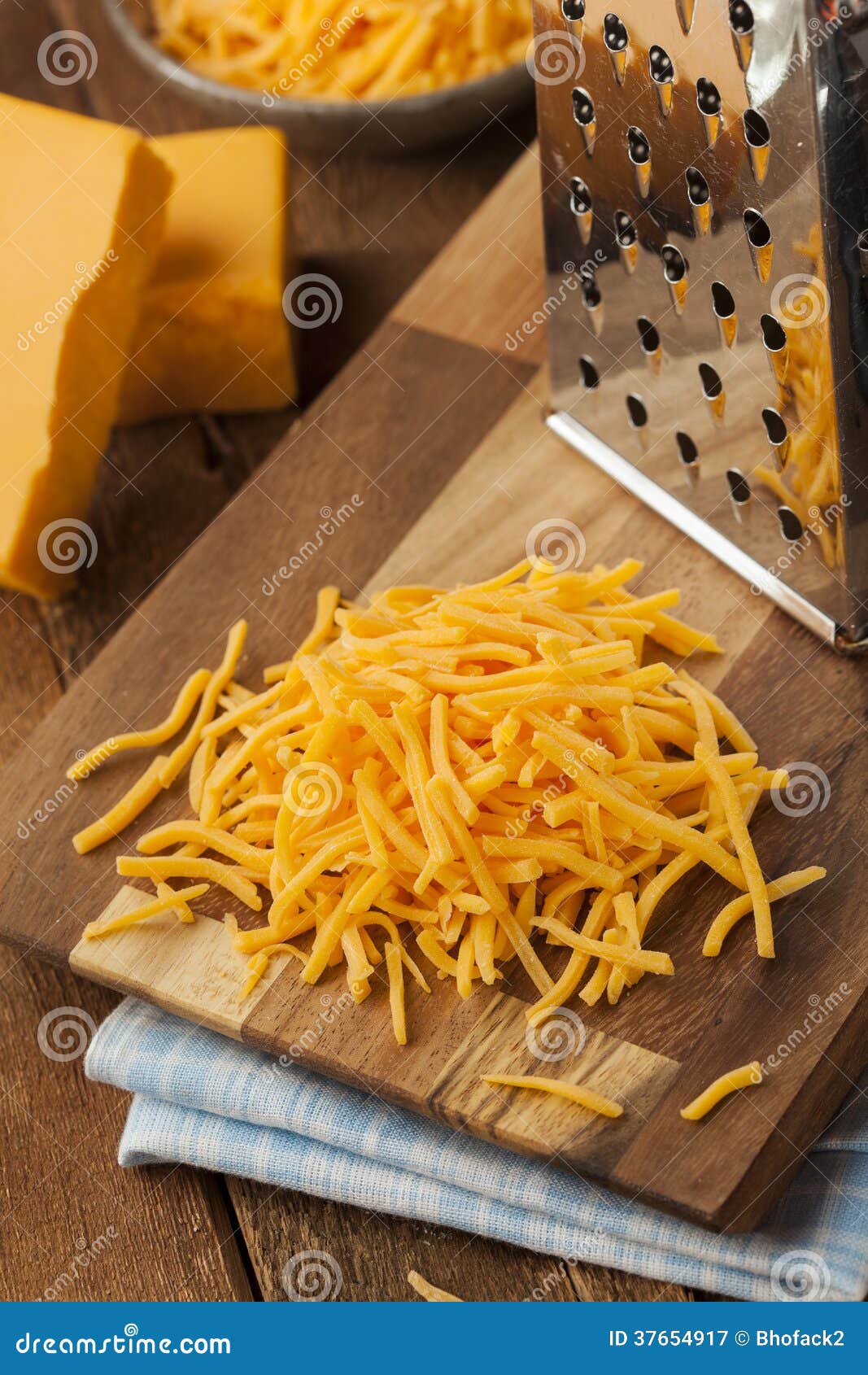 Organic Shredded Sharp Cheddar Cheese Stock Image - Image of product ...
