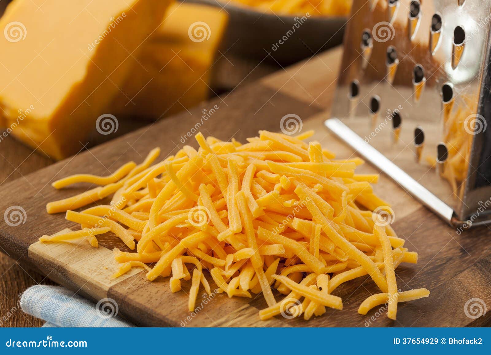 Organic Shredded Sharp Cheddar Cheese Stock Image - Image of grated ...