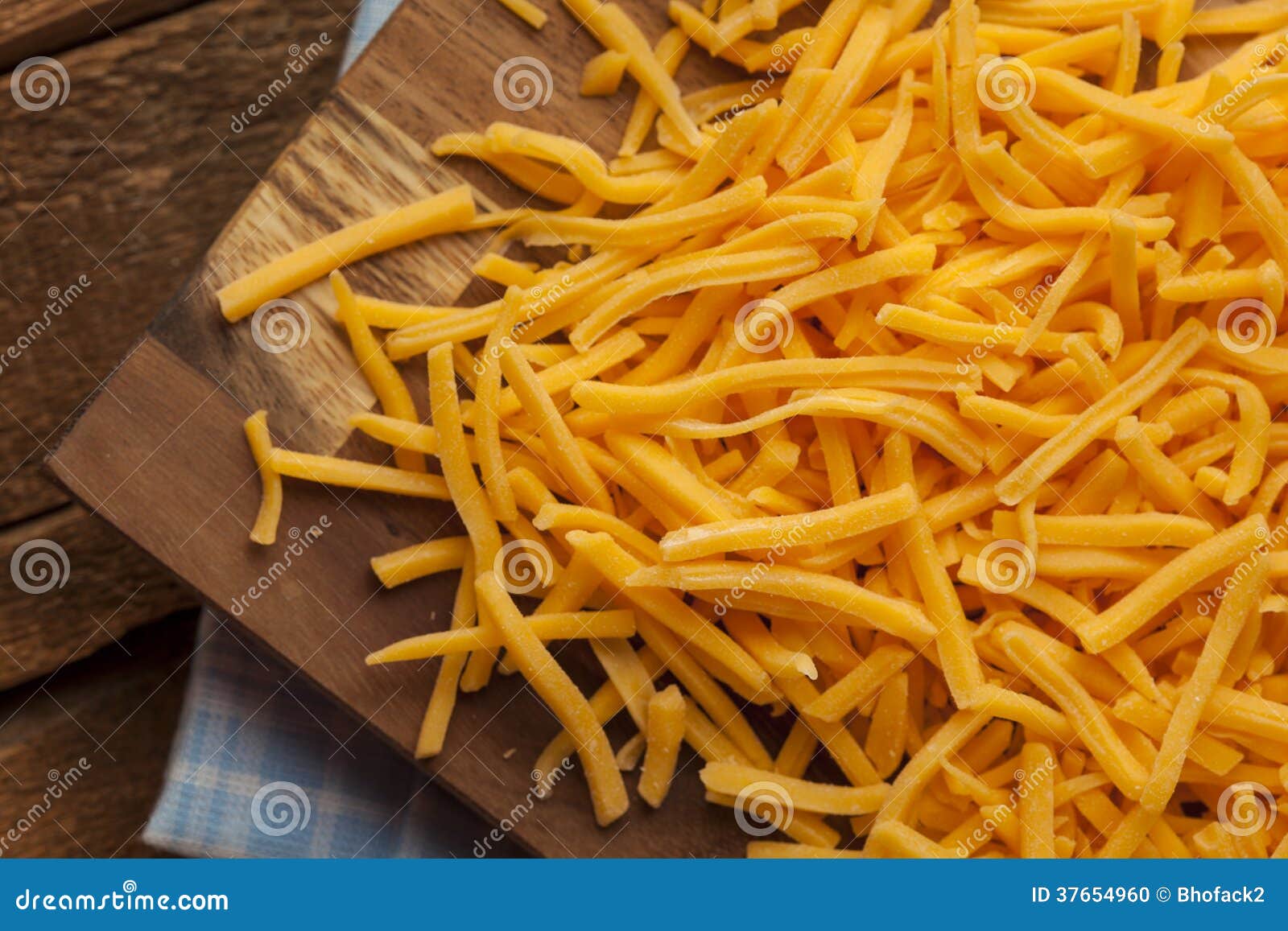Organic Shredded Sharp Cheddar Cheese Stock Photo - Image of cheez ...