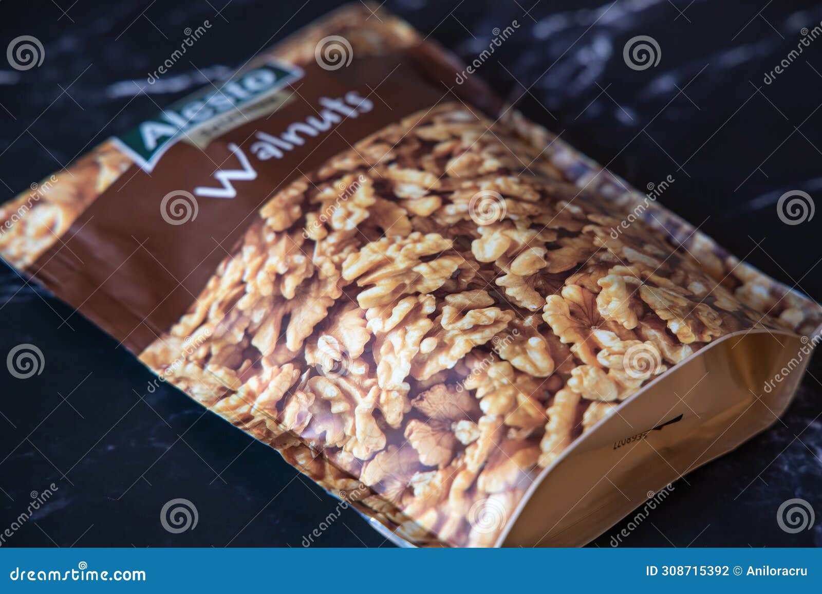 Organic Walnuts in a Package on a Dark Background. Editorial ...