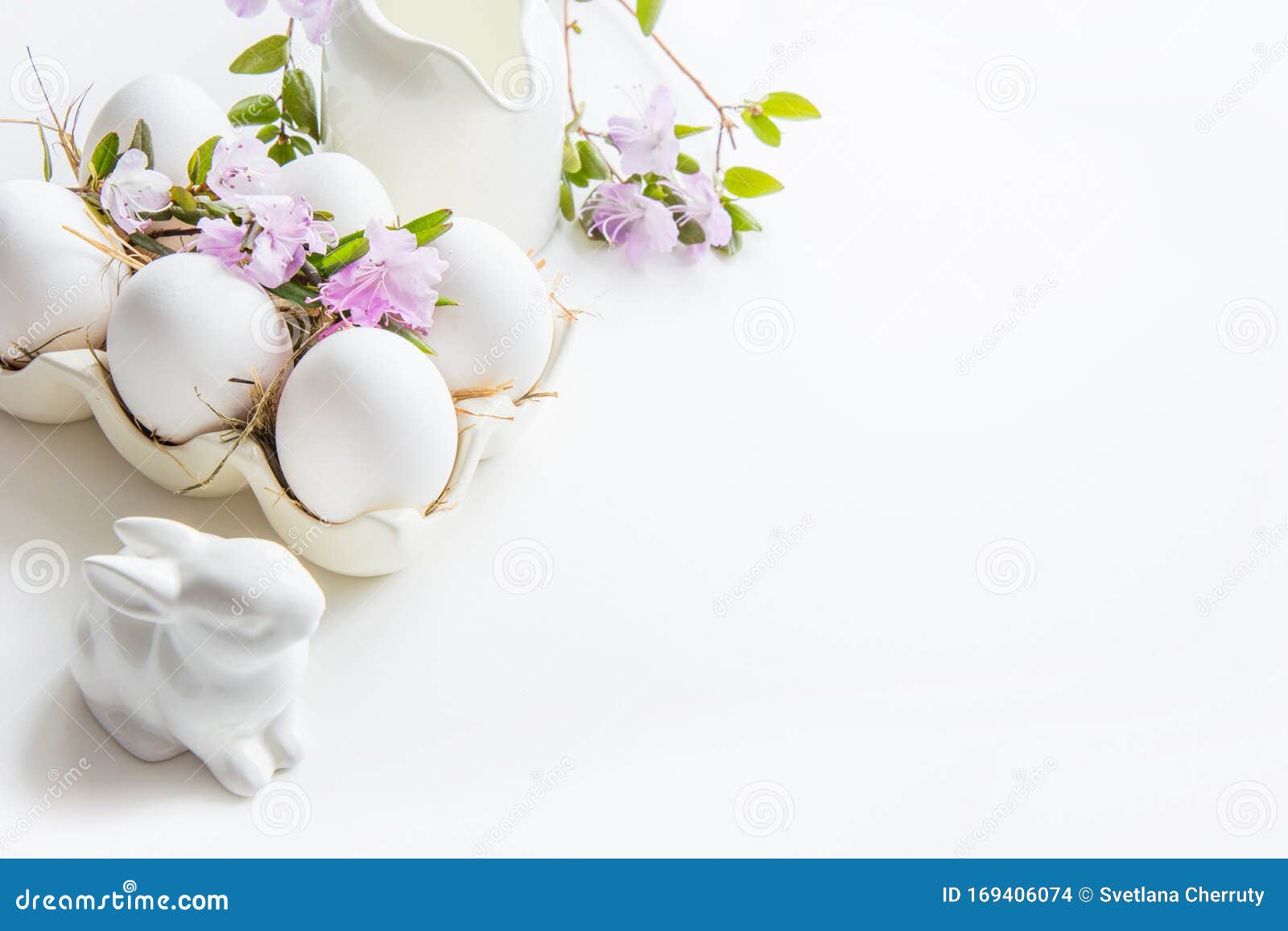 Organic White Chicken Eggs with Spring Flowers on White. Easter Stock ...
