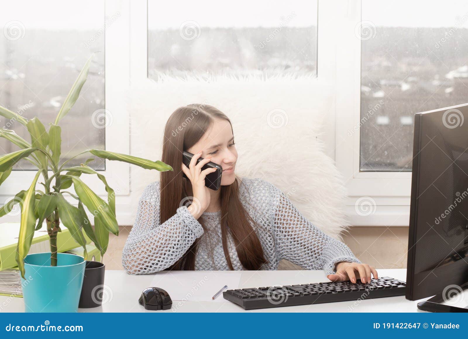 Organization of Home Office, Remote Work Device. a Young Girl Sits at a ...