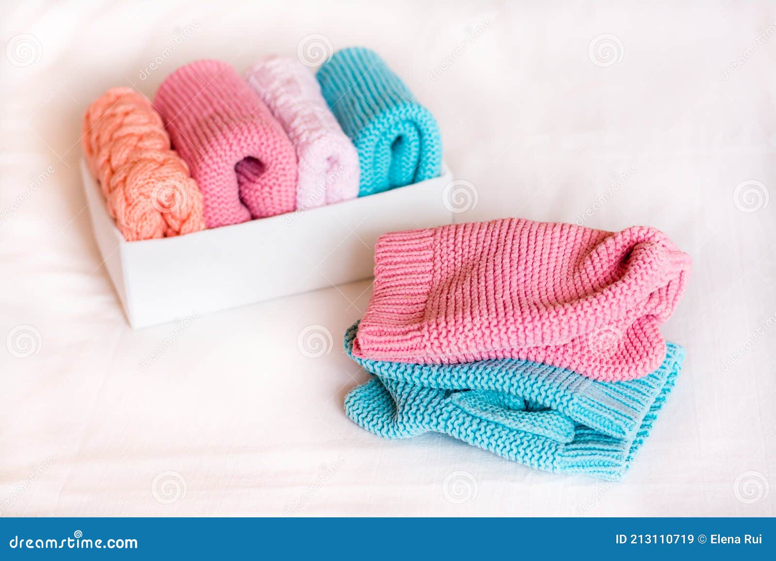 Organization and Order. Knitted Clothes Lie Next To a Box of Neatly ...