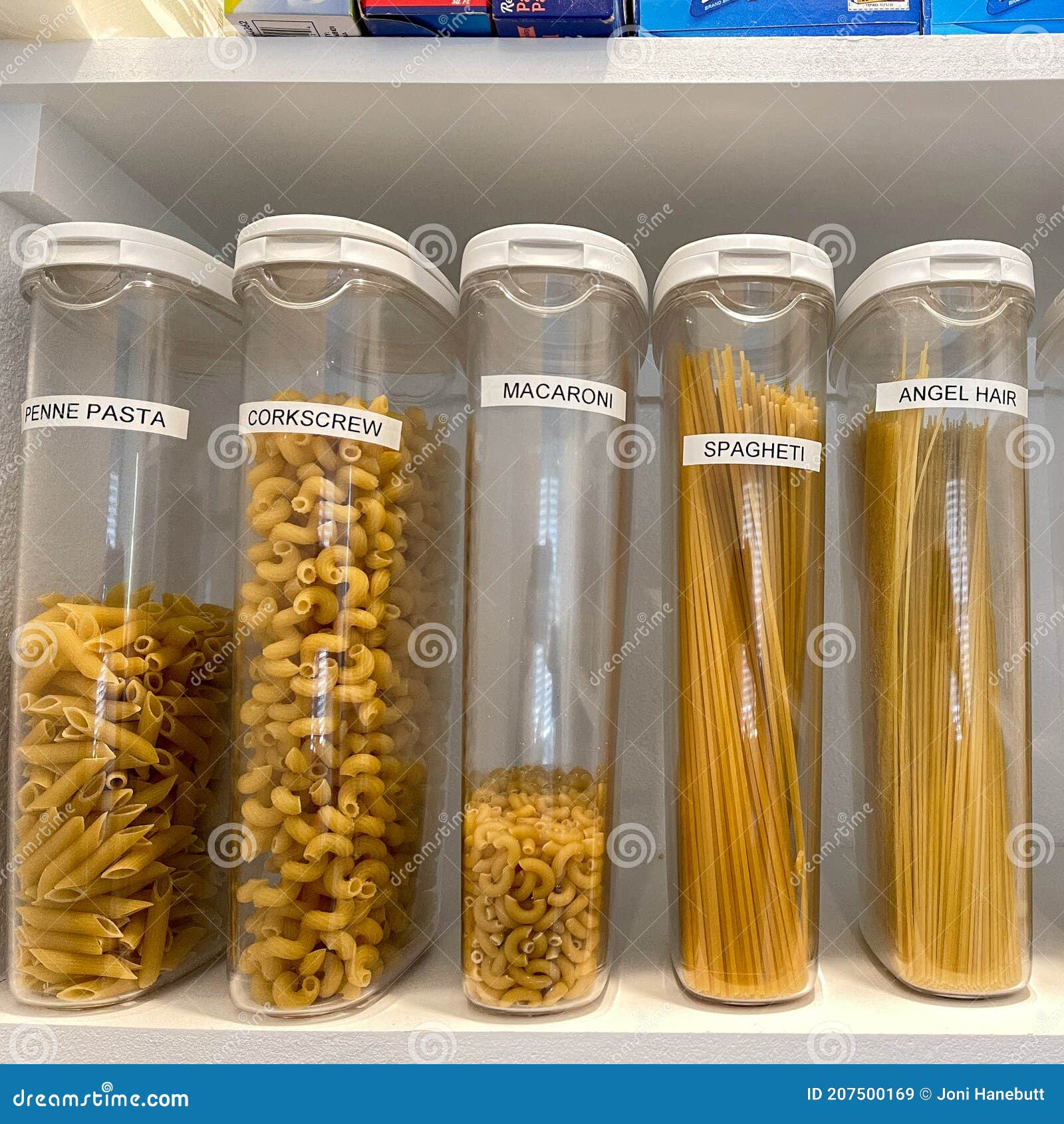 An Organized Pantry Shelf with Various Types of Pasta Stock Image ...