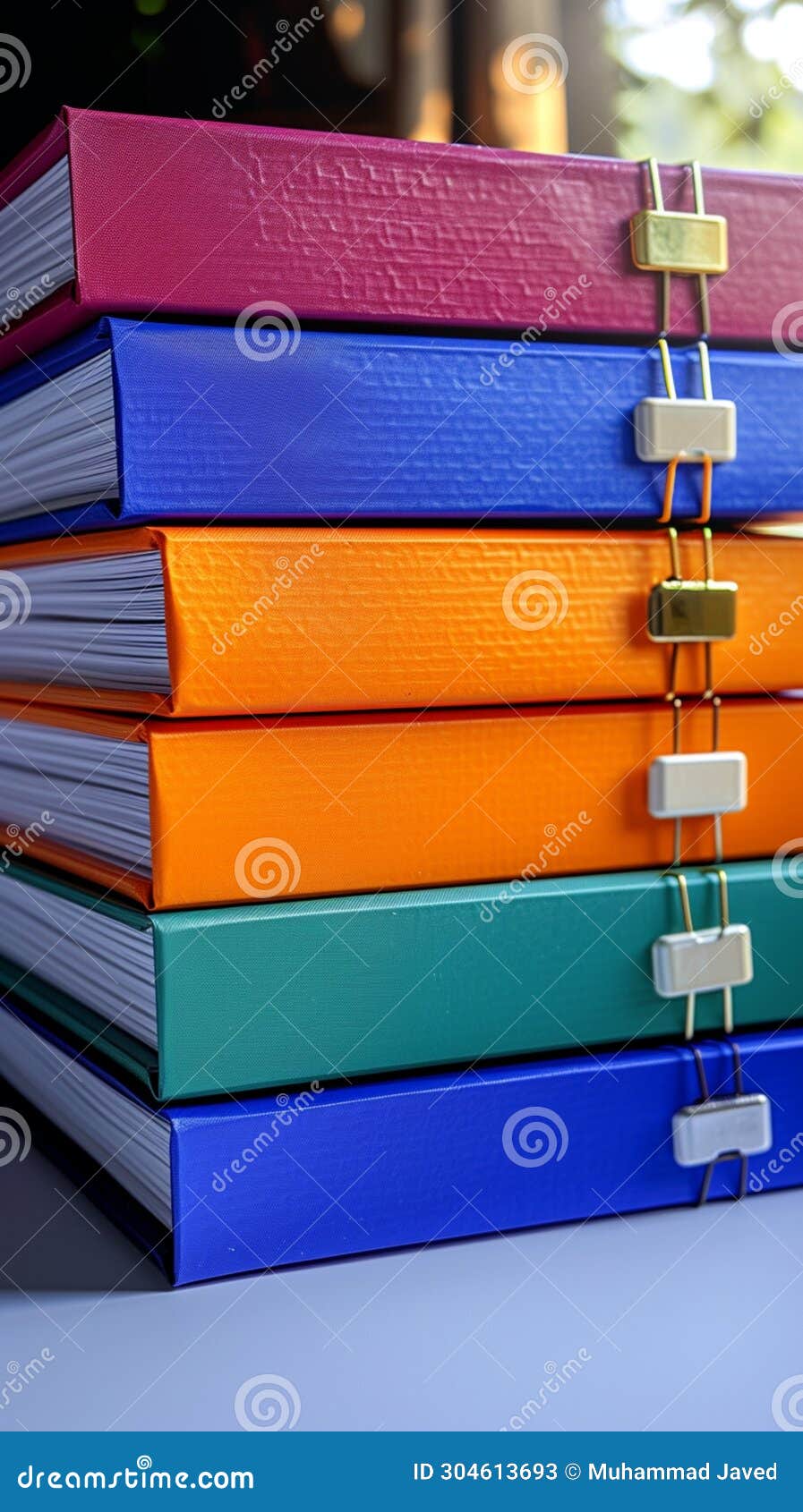 Organized Workspace Stack of Colorful File Folders on Office Table ...