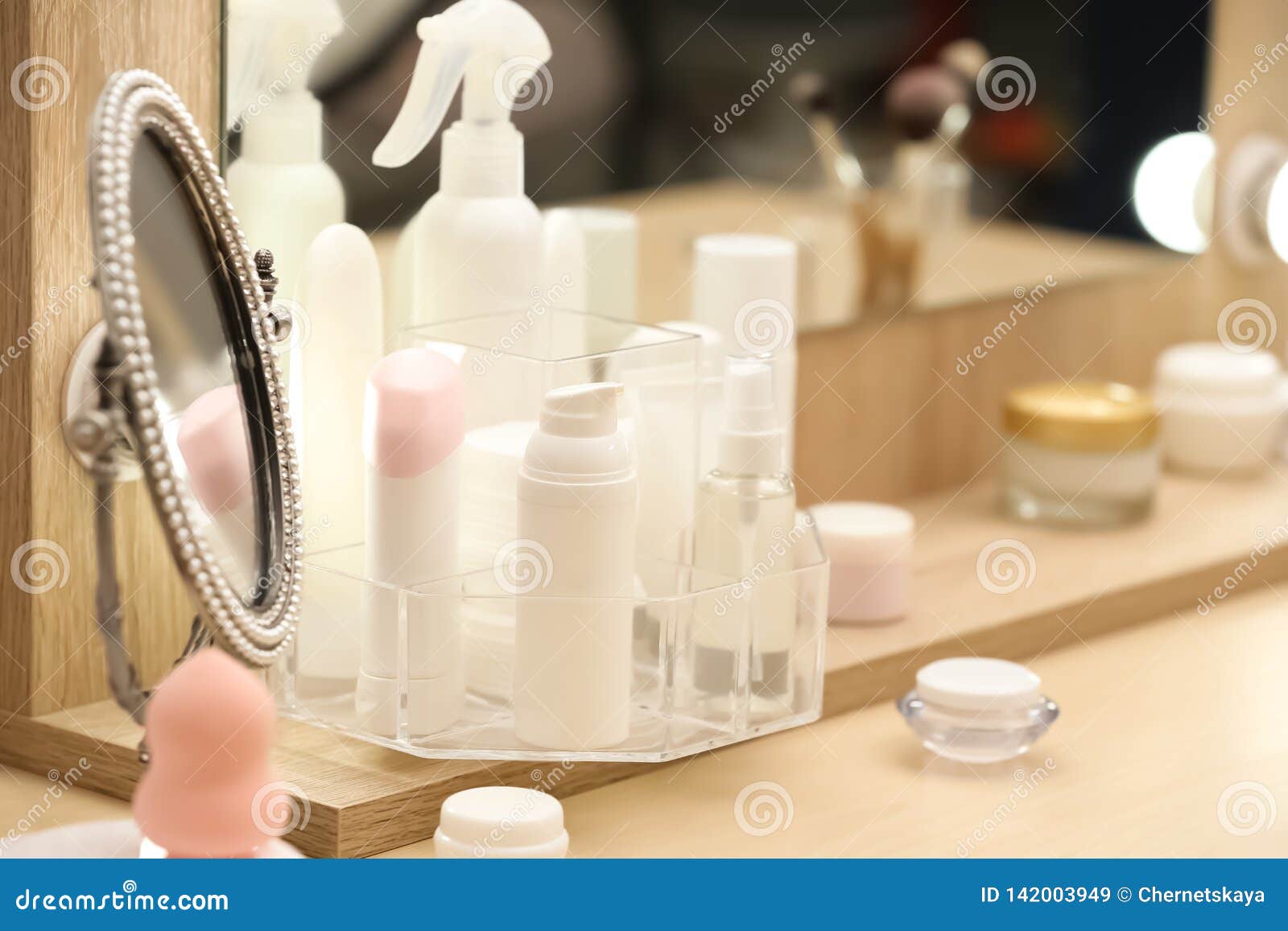 Organizer with Cosmetic Products on Dressing Table Stock Image - Image ...