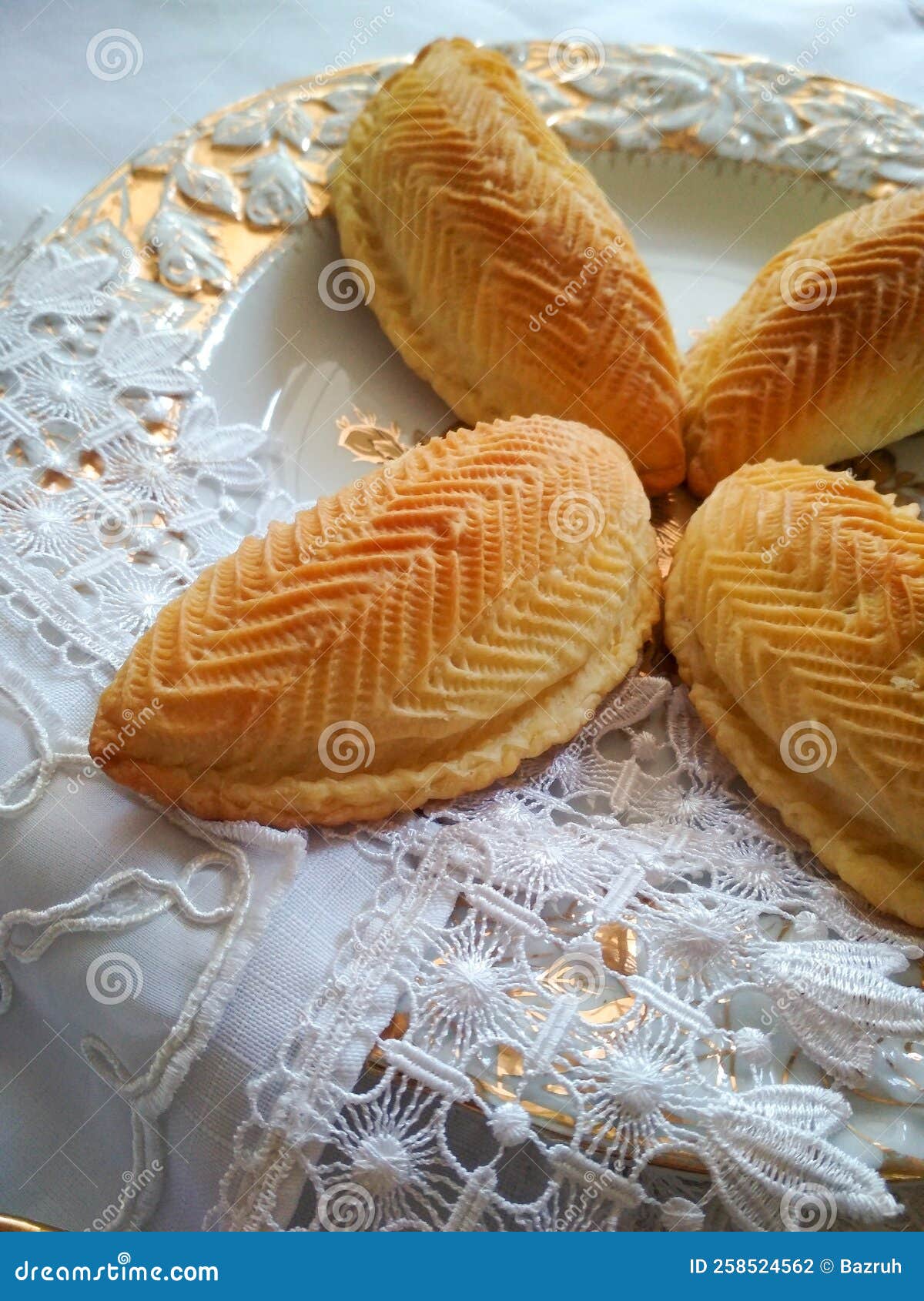 Oriental sweets on a plate stock photo. Image of hazelnut - 258524562