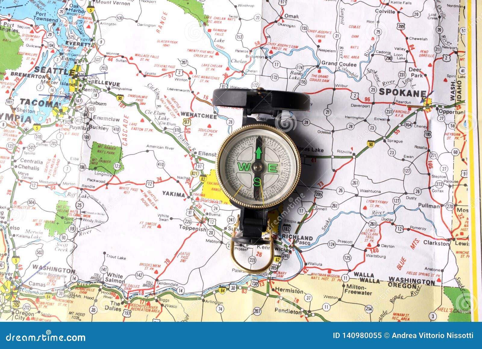 An Orientation Compass Rest on a Geographic Map and Copy Space for Your ...