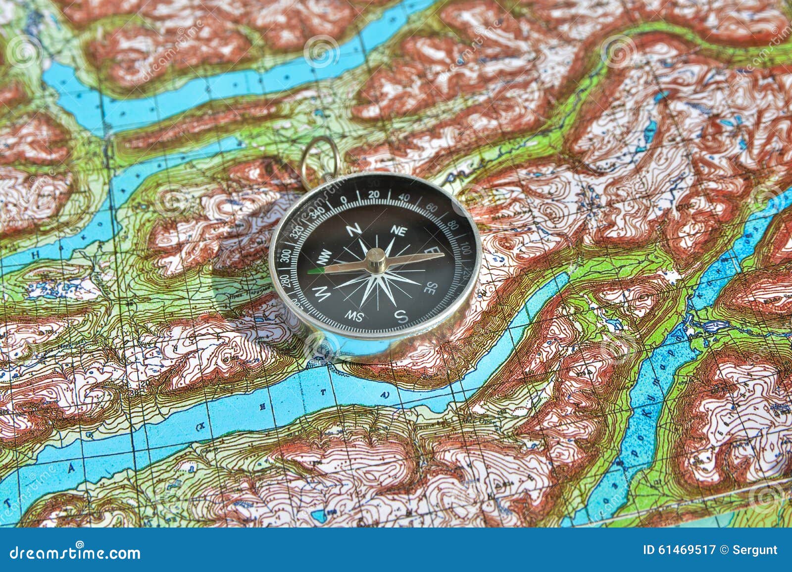 Orienteering in the wild. stock image. Image of equipment - 61469517