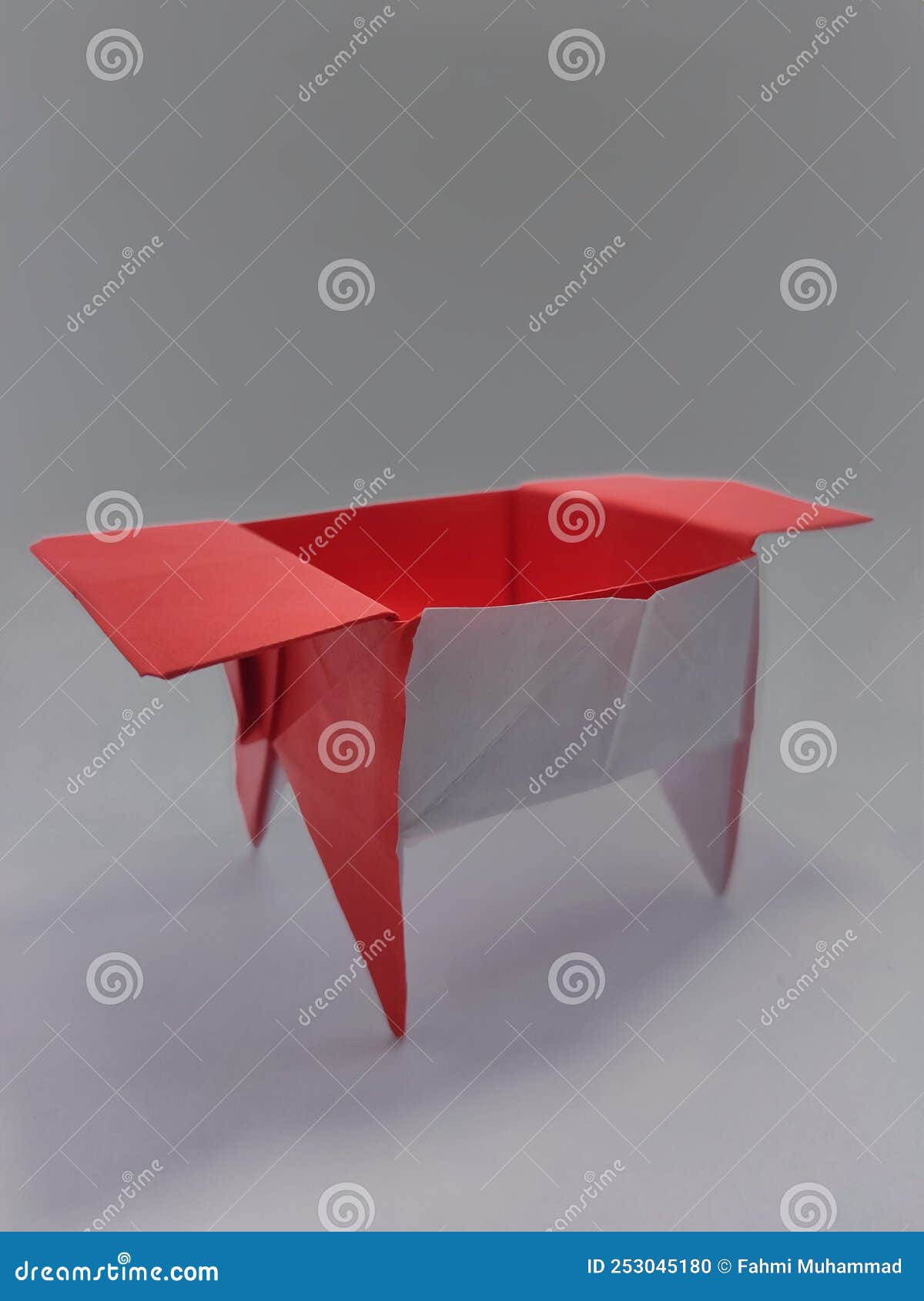 Origami Art of Paper Folding with Red Paper and White Background Stock ...