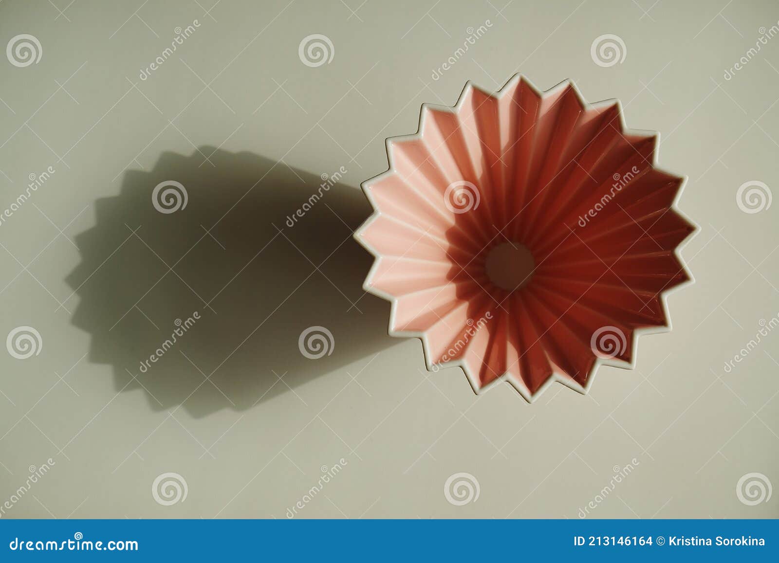 Origami Coffee Dripper on White Background. Bright Sunlight and ...