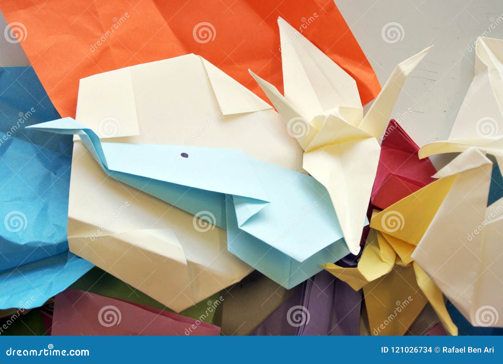 Origami Shapes on a Table Bacground Stock Photo - Image of multicolored ...