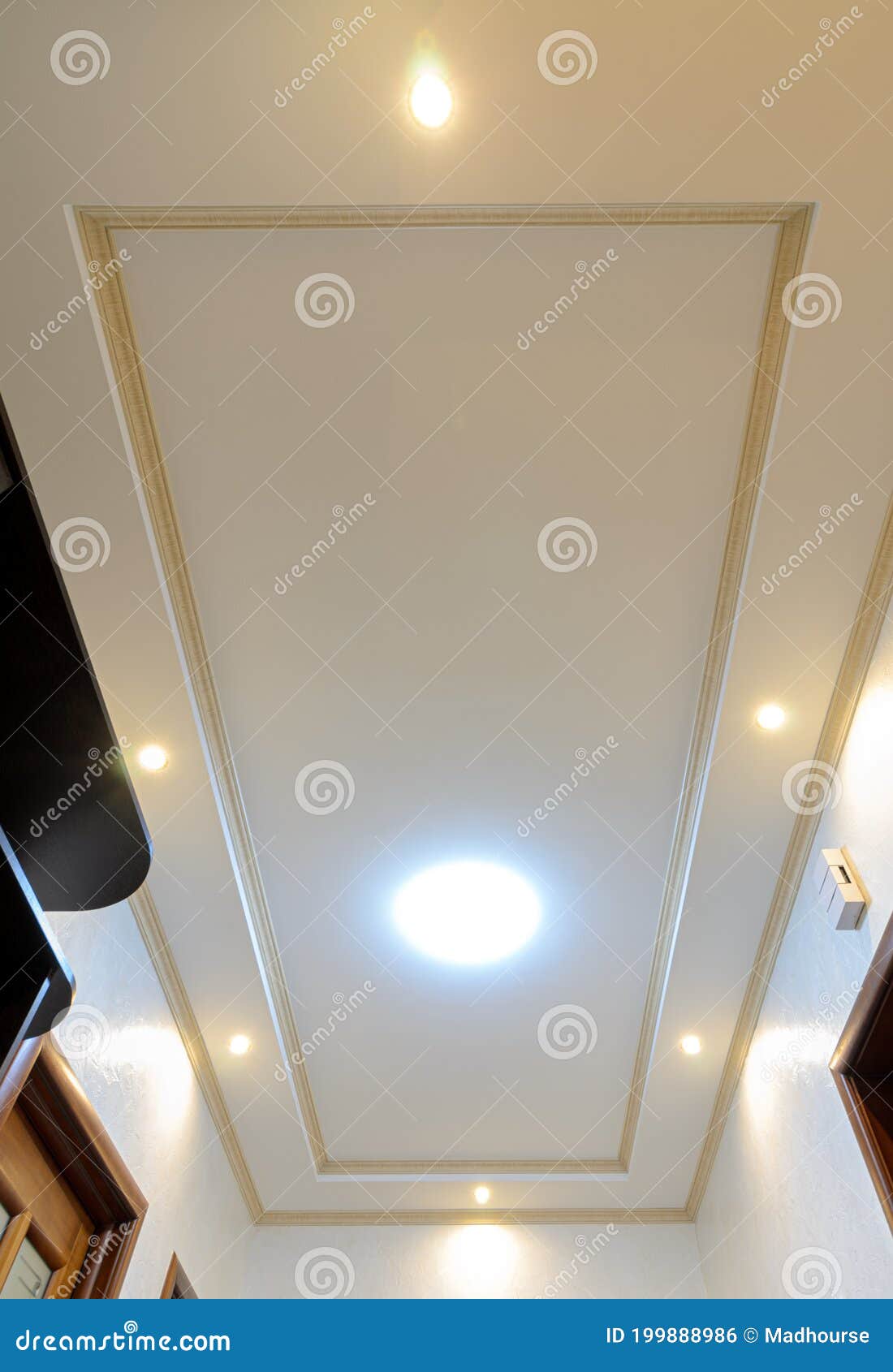 Original Stylish Multi-level Ceiling in the Hallway of the Apartment ...