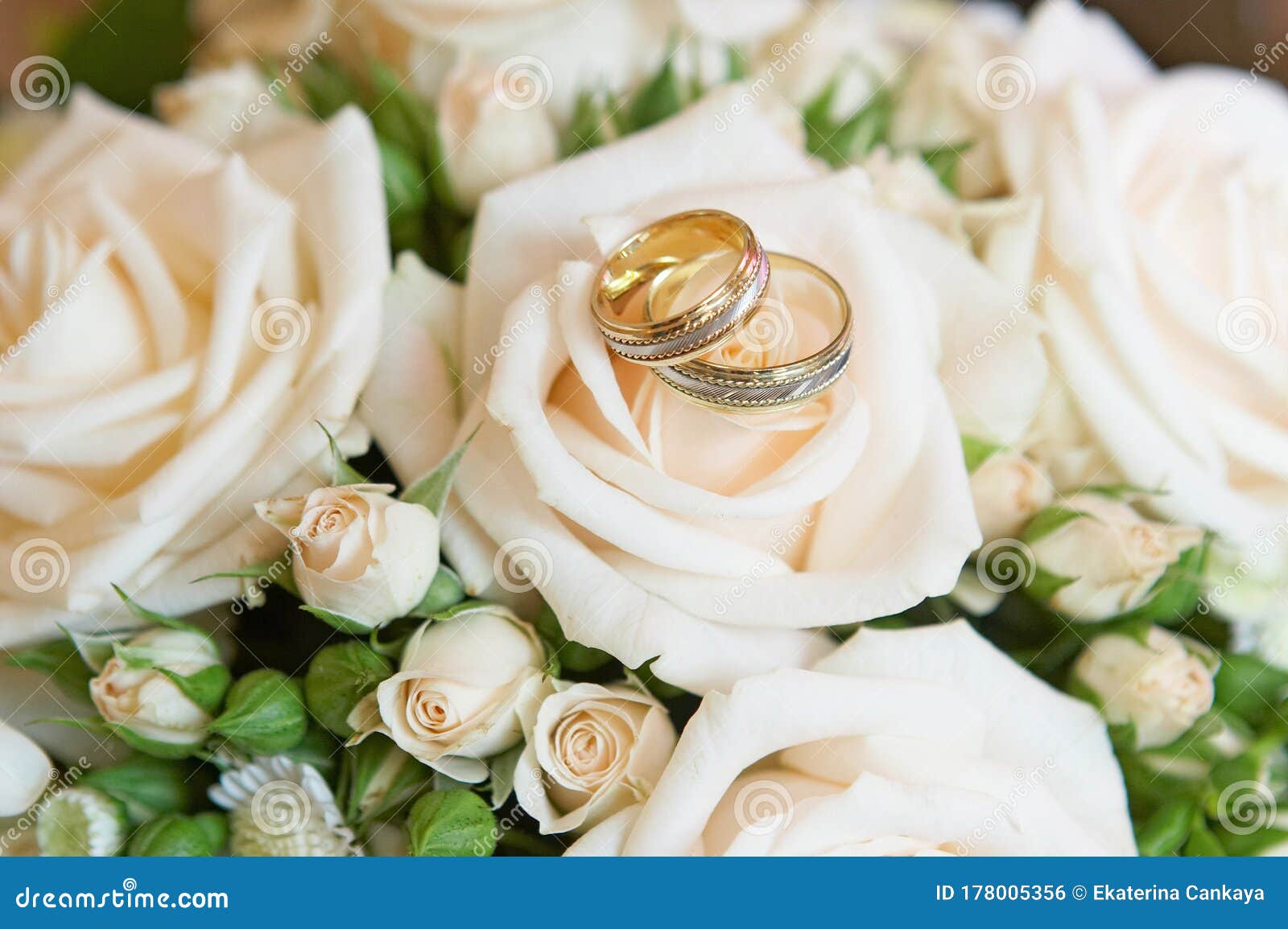 Original Wedding Rings on Beautiful White Roses Wedding Bouquet Stock ...