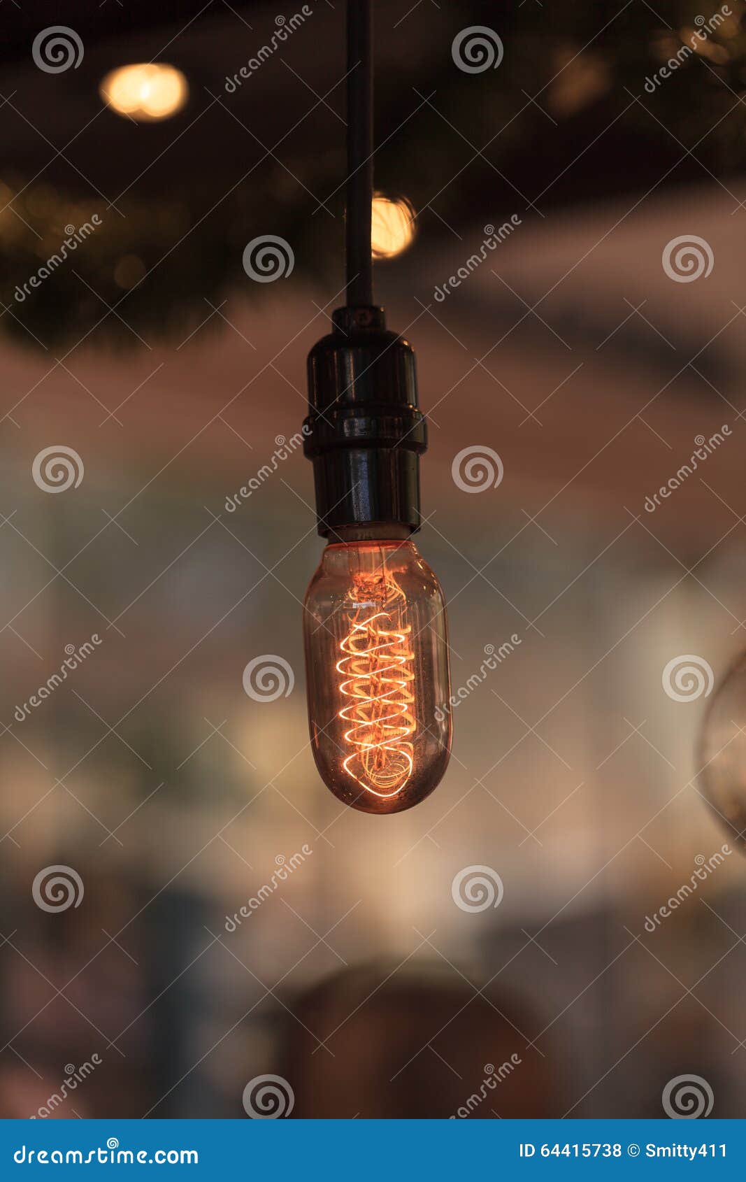 Ornamental light bulb lit stock photo. Image of knowledge - 64415738