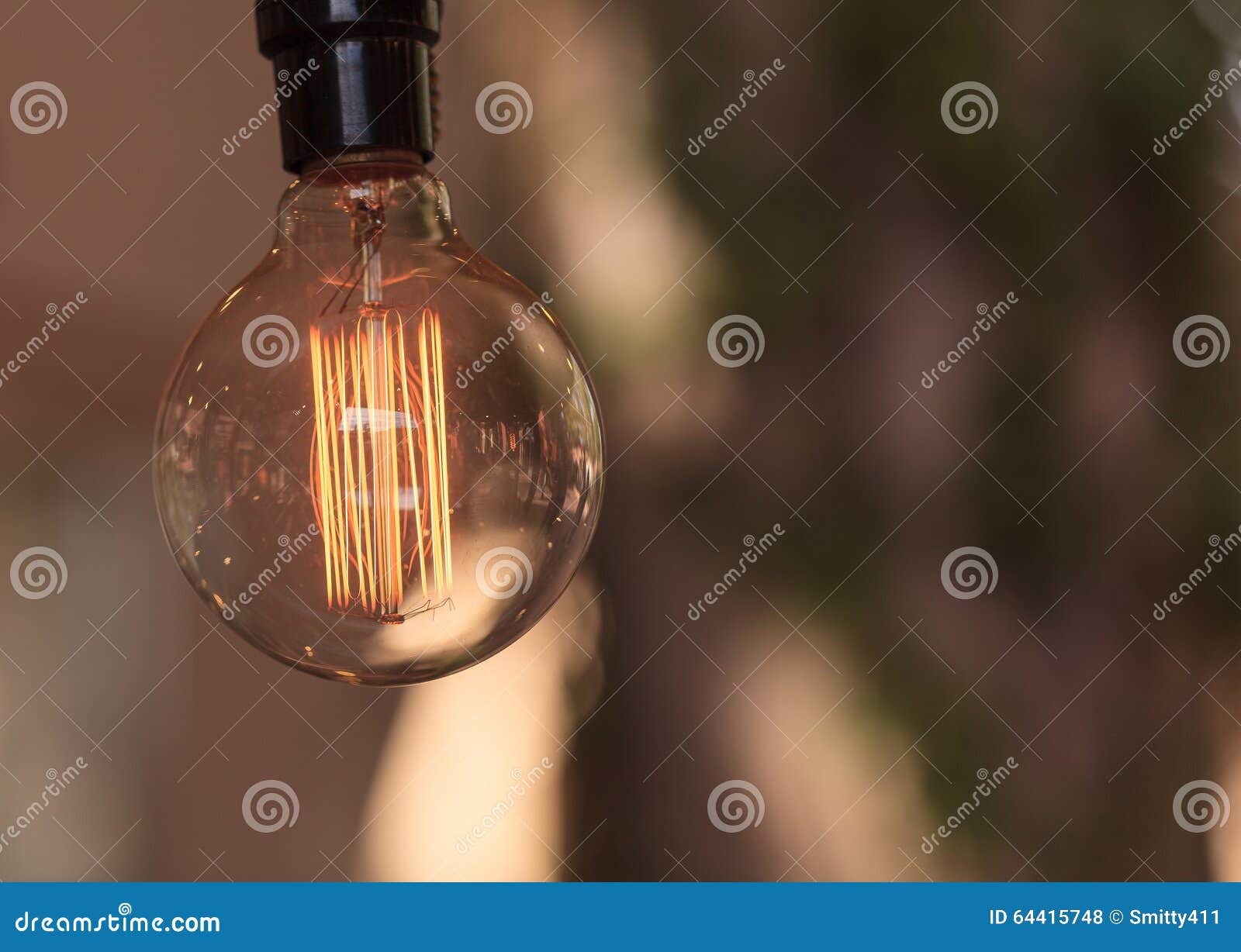 Ornamental light bulb lit stock photo. Image of bulb - 64415748