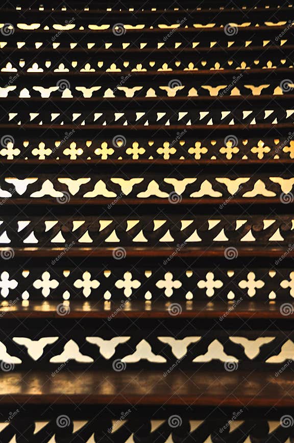 Ornamental Wooden Stairs with Intricate Lace Pattern, Warm Light ... Ornamental Wooden Stairs with Intricate Lace Pattern, Warm Light ...