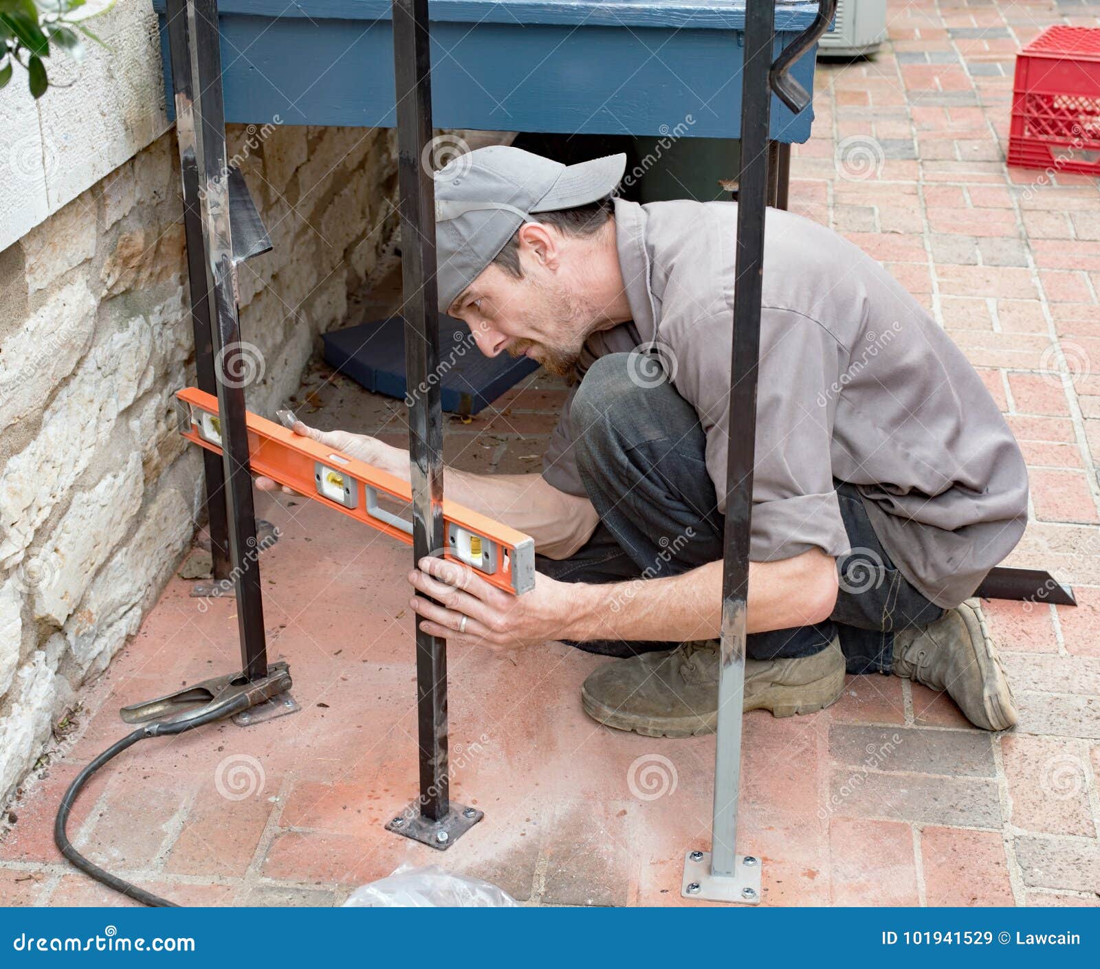 Iron Worker Checking Work Level Stock Image - Image of metal, adult ...