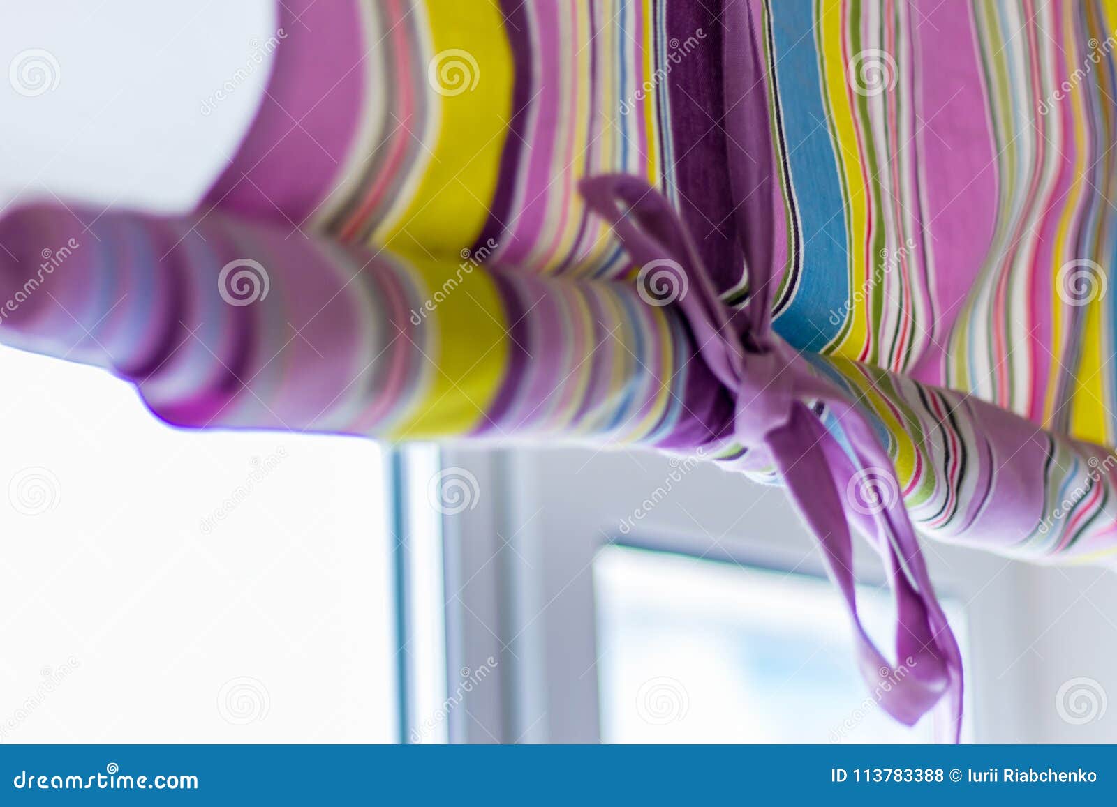 Ornate Colourful Curtain with Lines Covering the Whole Window Stock ... Ornate Colourful Curtain with Lines Covering the Whole Window Stock ...